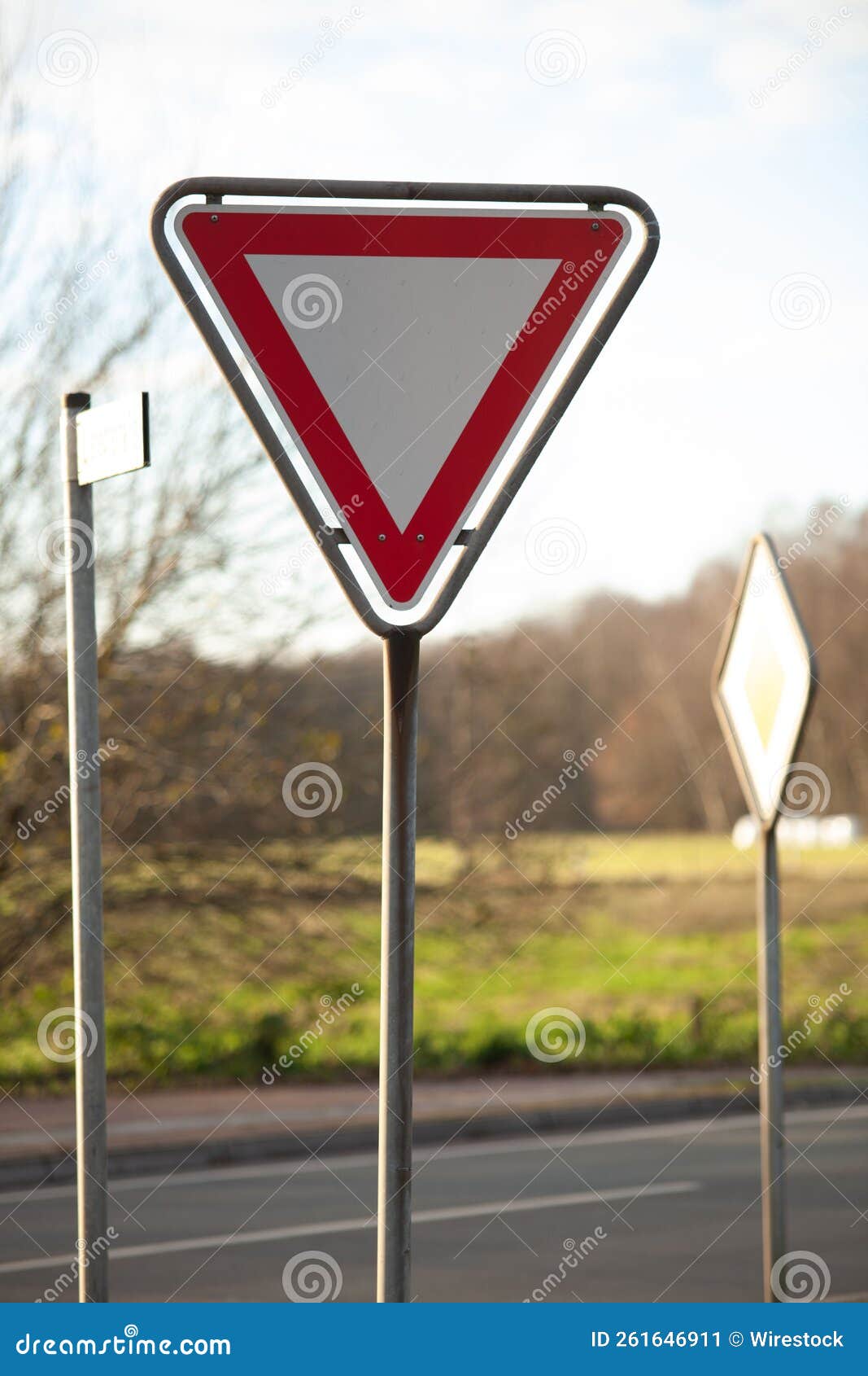 Give-way sign on a road editorial photo. Illustration of information ...
