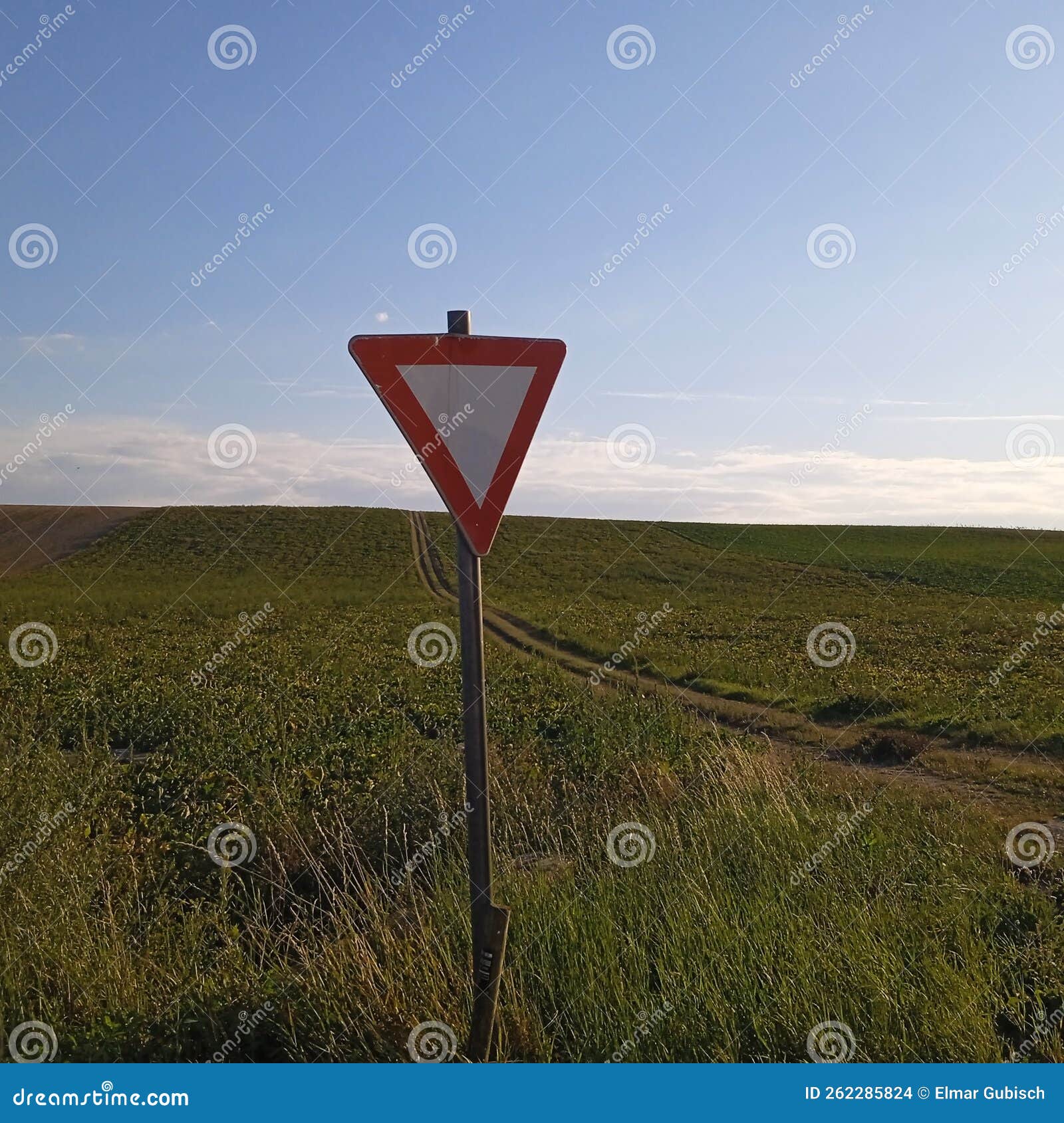 A Give Way or Yield Traffic Sign Stock Photo - Image of pictograms ...