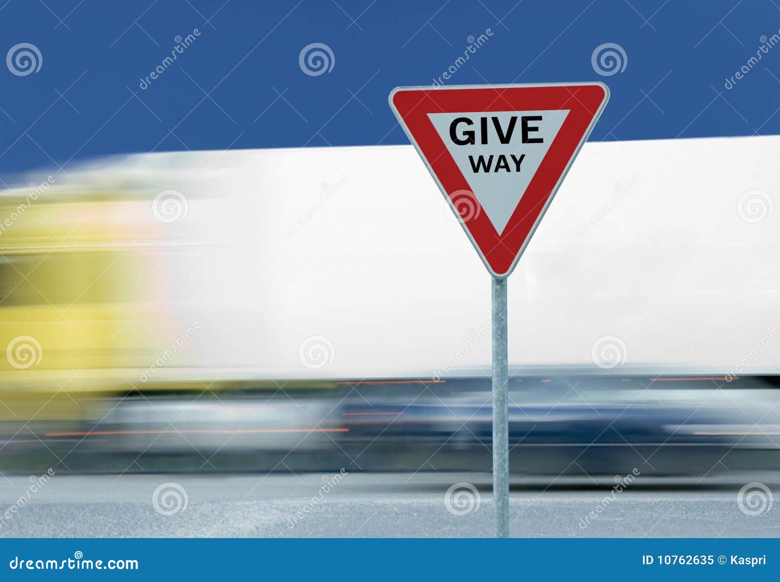 Give Way Yield Road Traffic Sign, Motion Blurred Truck Background, Blue ...
