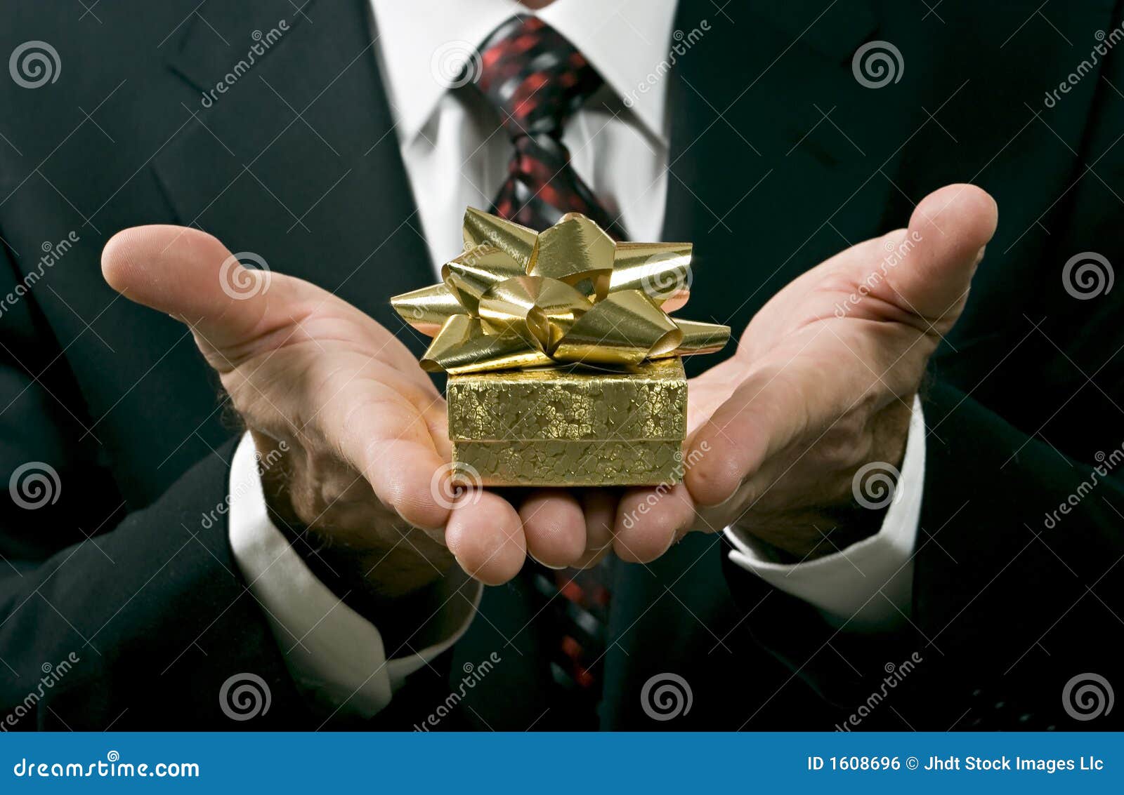 Giving stock photo. Image of gold, smiling, suit, pleased - 1608696