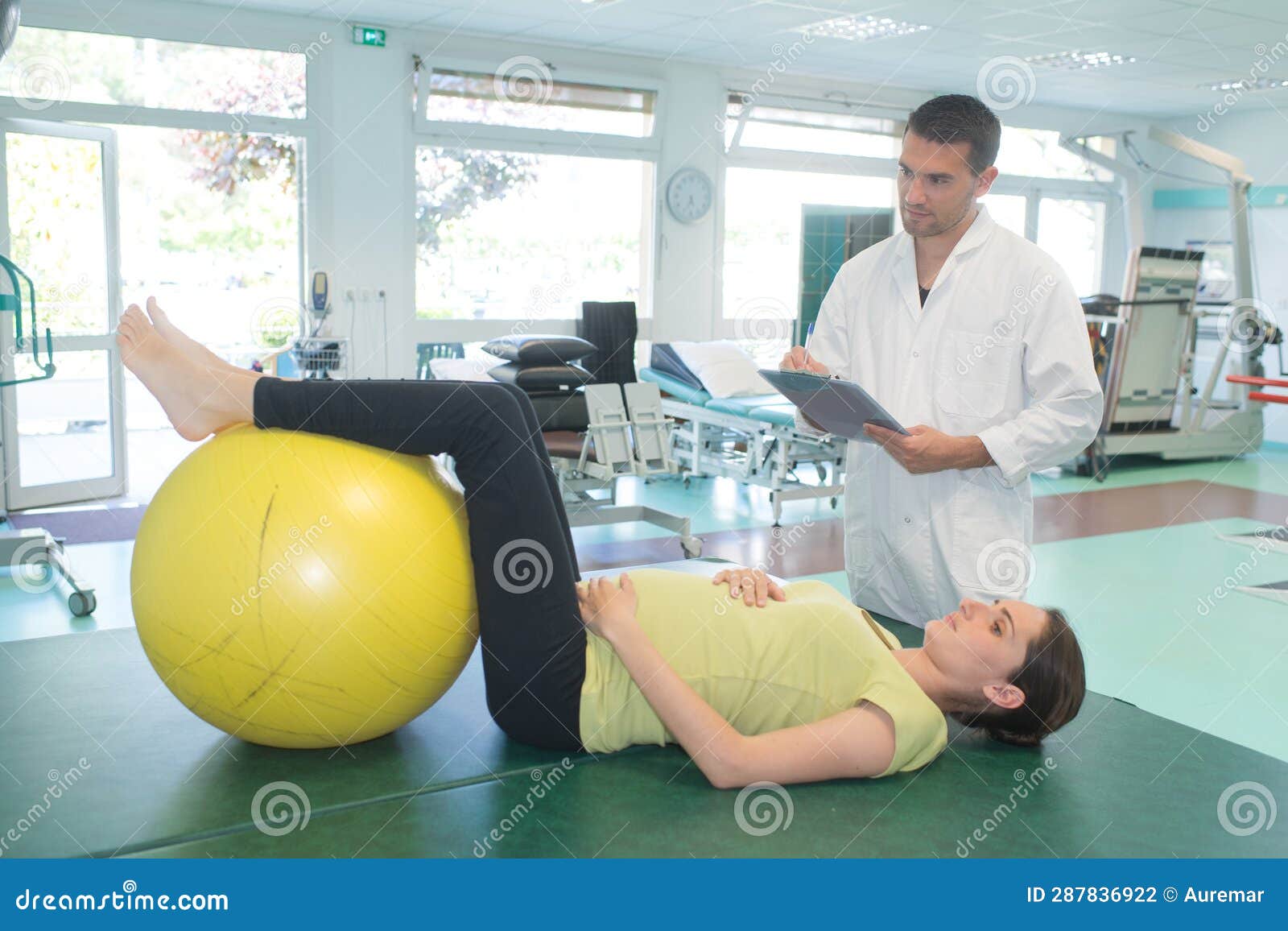 She Giving Birth with Class Instructor Stock Photo - Image of woman ...