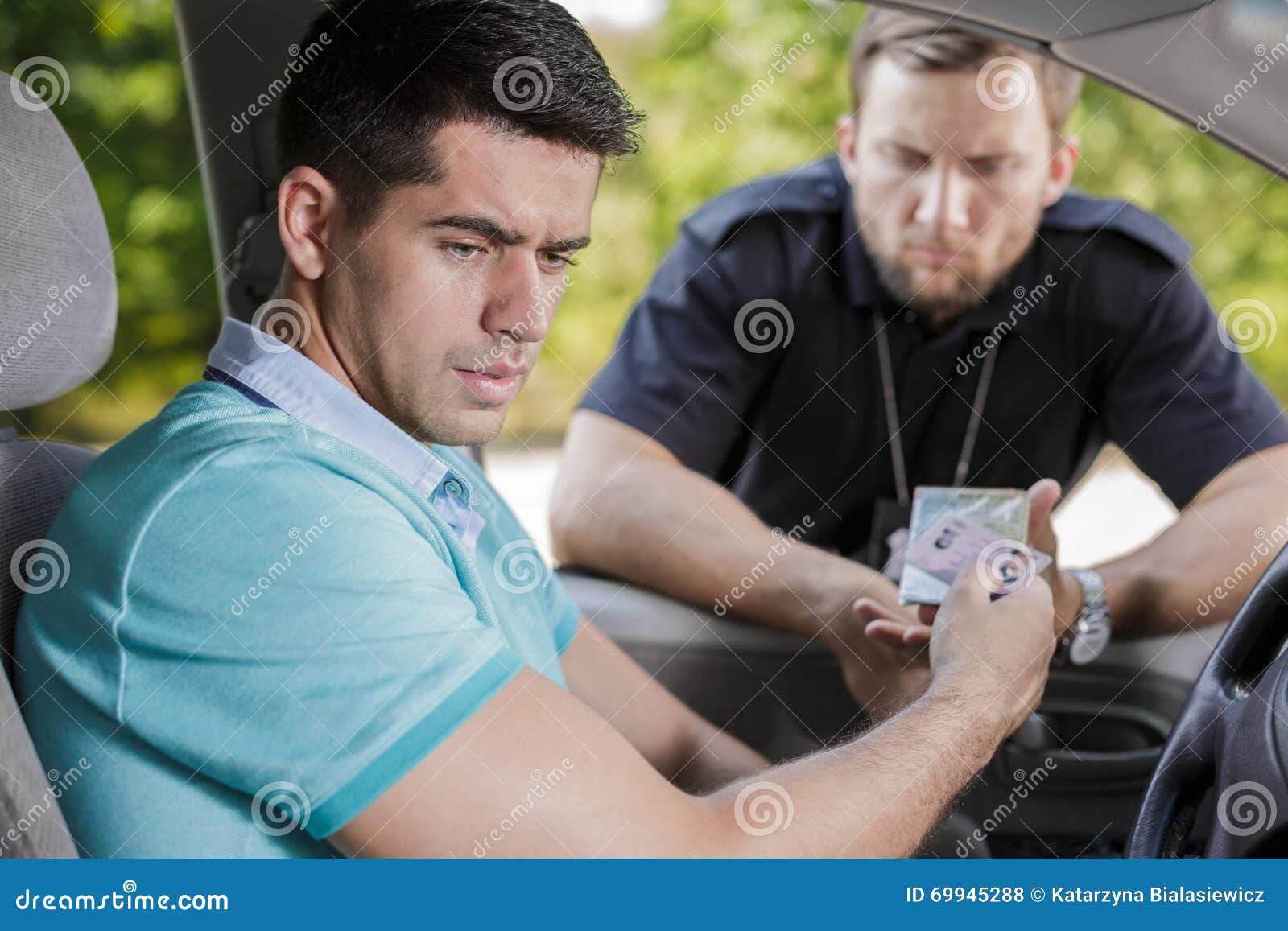 Giving a driving licence stock photo. Image of driver - 69945288