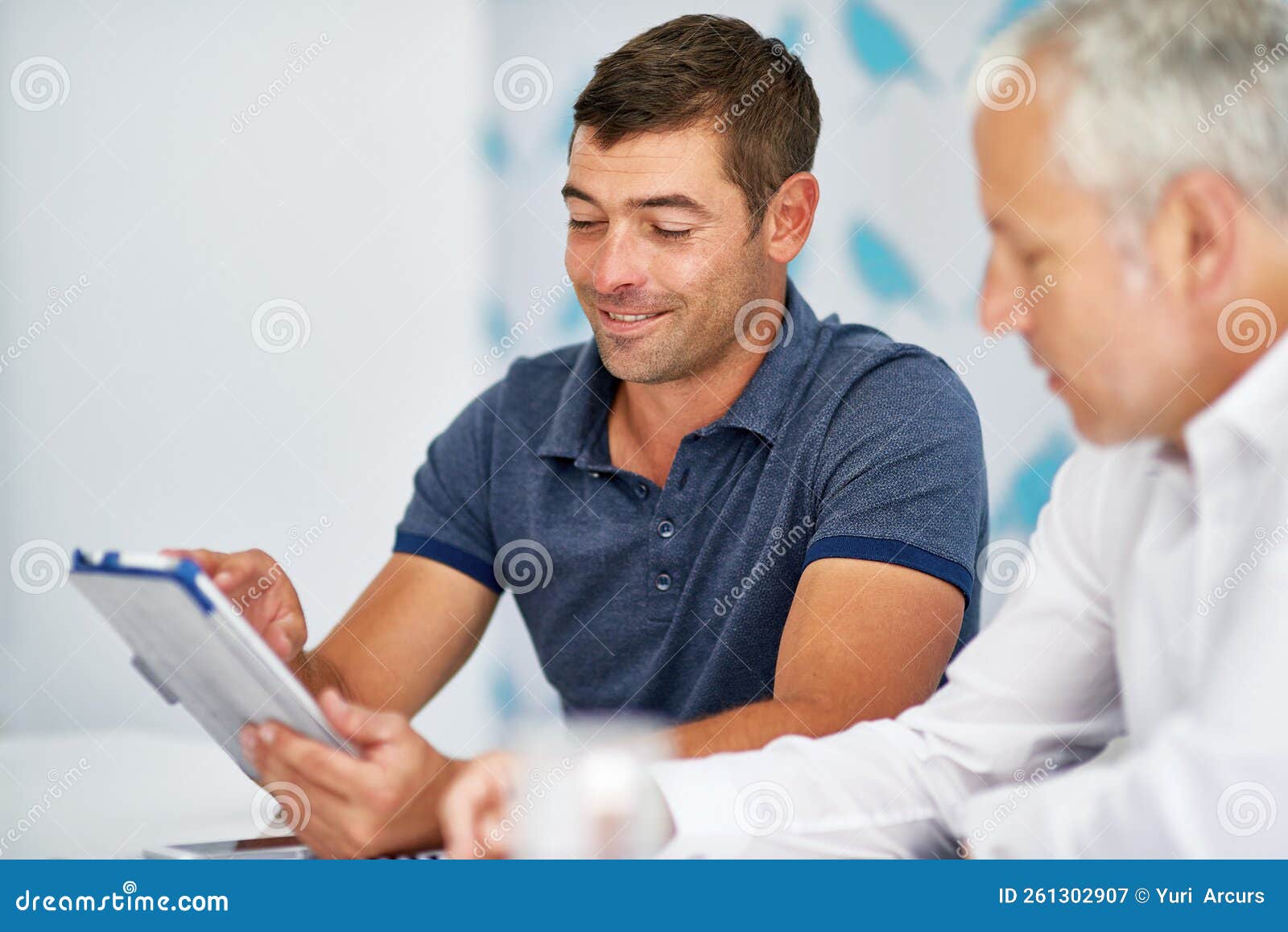 Giving Him an Update. Two Men Working in the Office. Stock Image ...