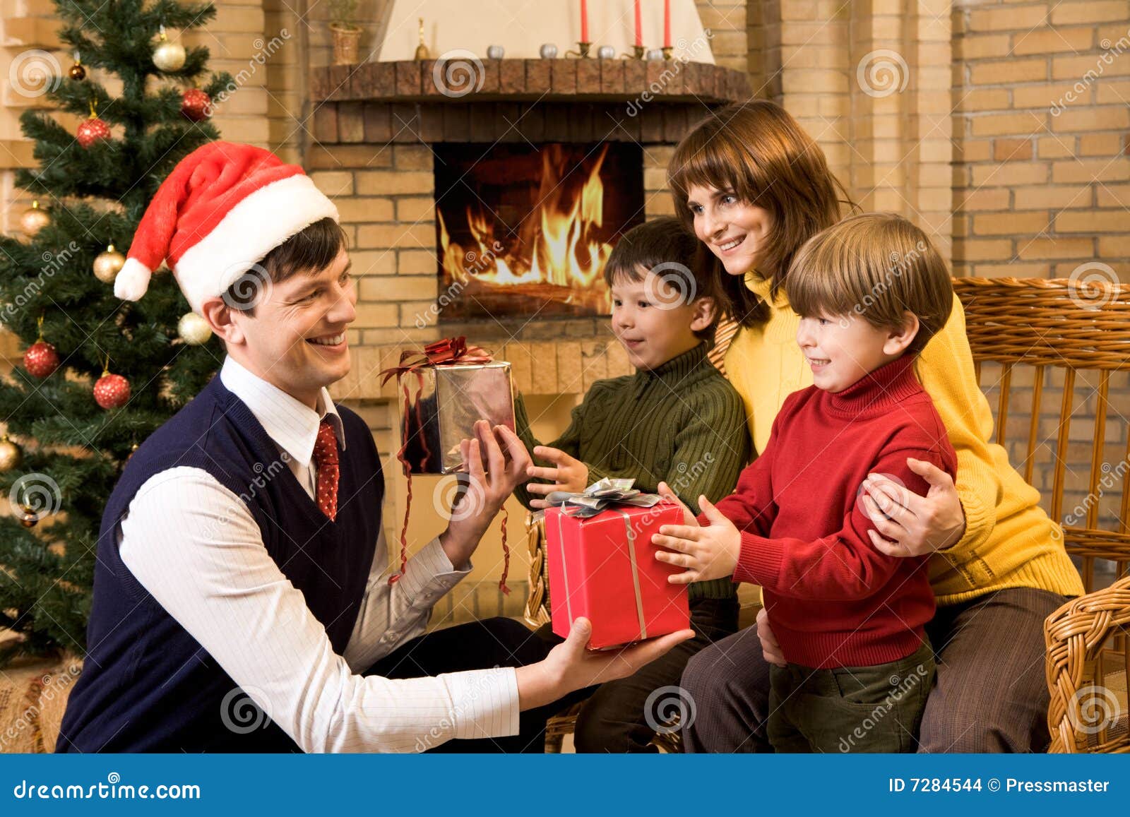 Giving presents stock photo. Image of receiving, noel - 7284544
