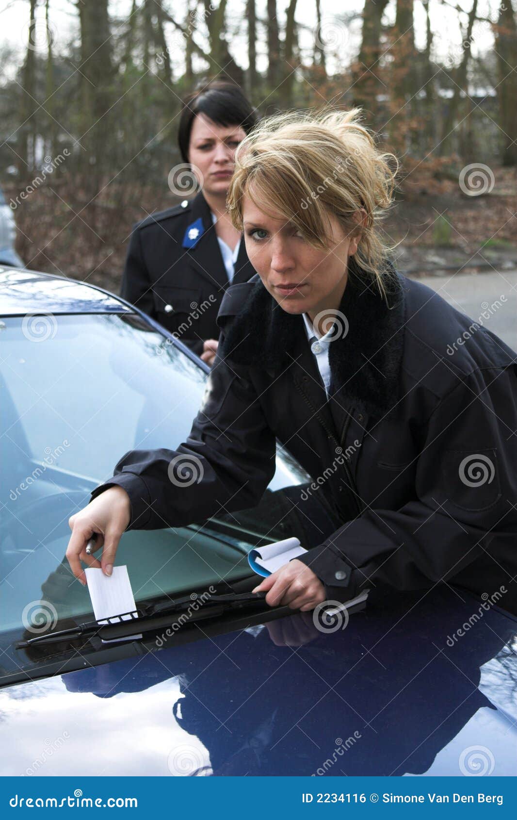 Giving a ticket stock photo. Image of parking, cops, professional - 2234116