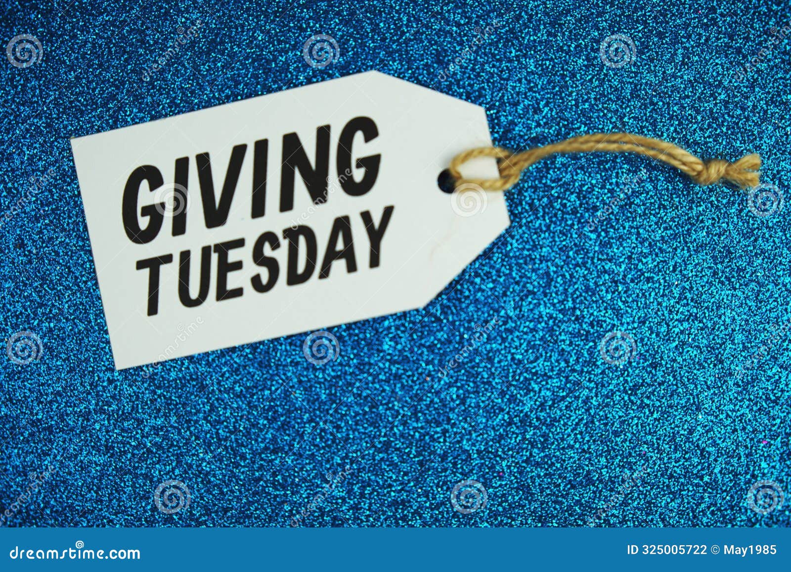 Giving Tuesday Text Message on Paper Tag with Space for Copy Background ...