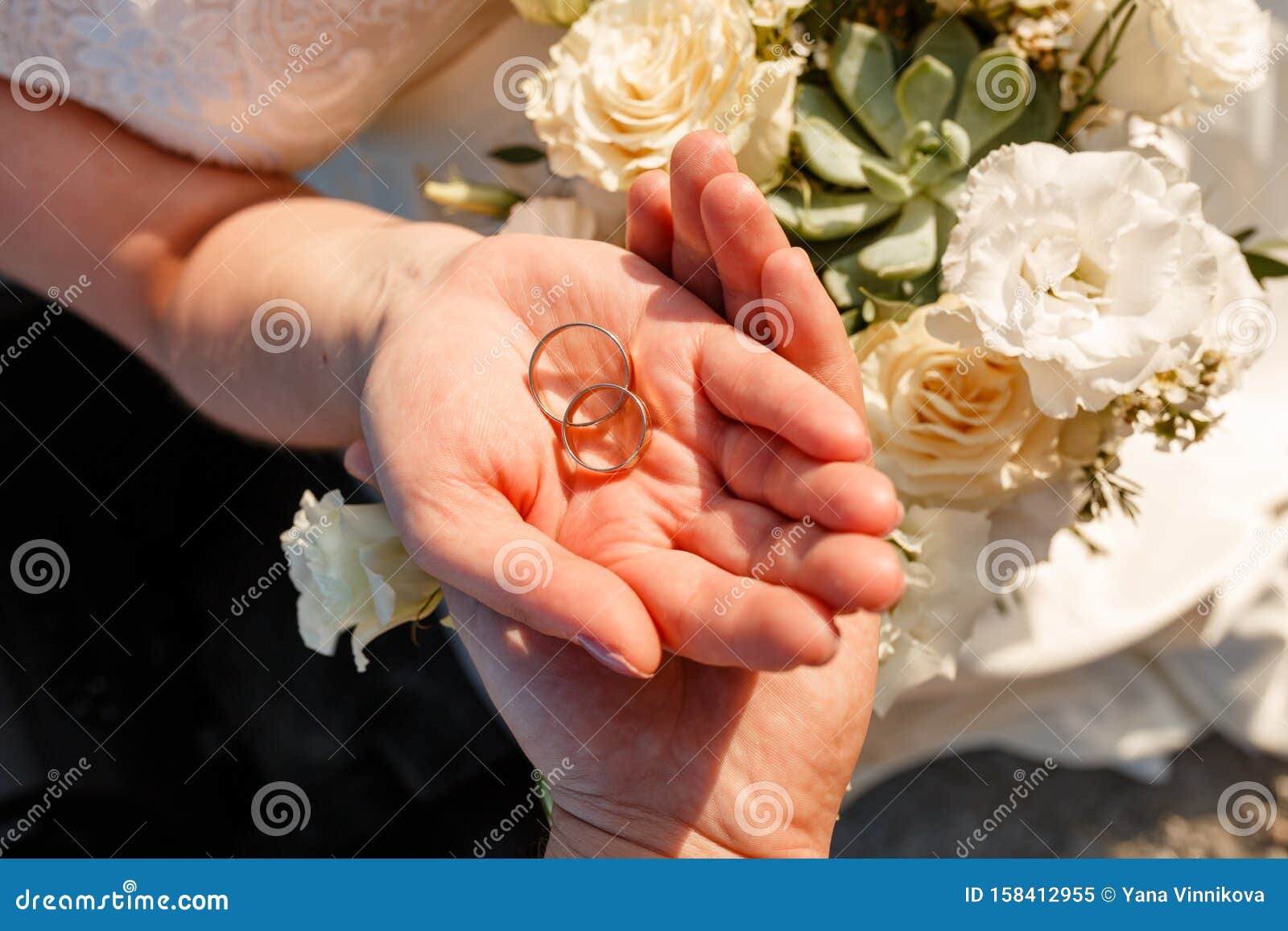Giving of Wedding Ring on the Wedding Flower Background Stock Image ...
