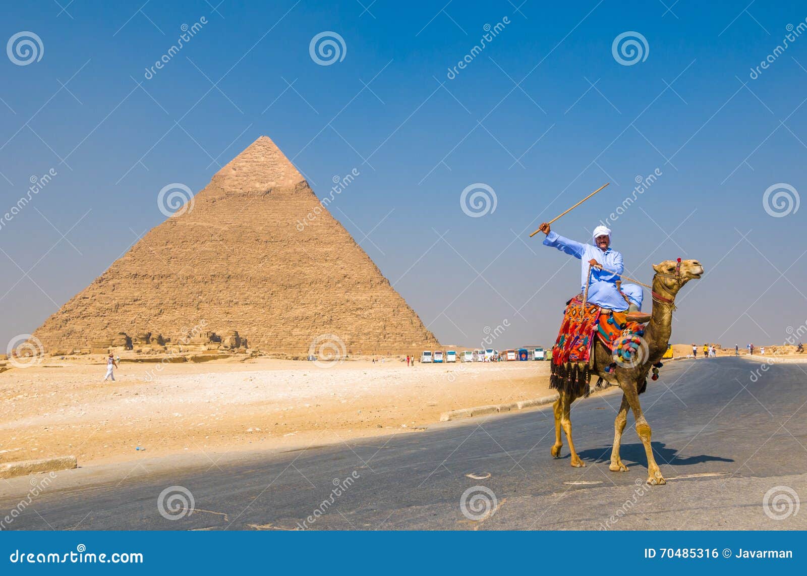GIZA, EGYPT - September, 16, 2008: Camel Rider and Pyramid of Khufu ...