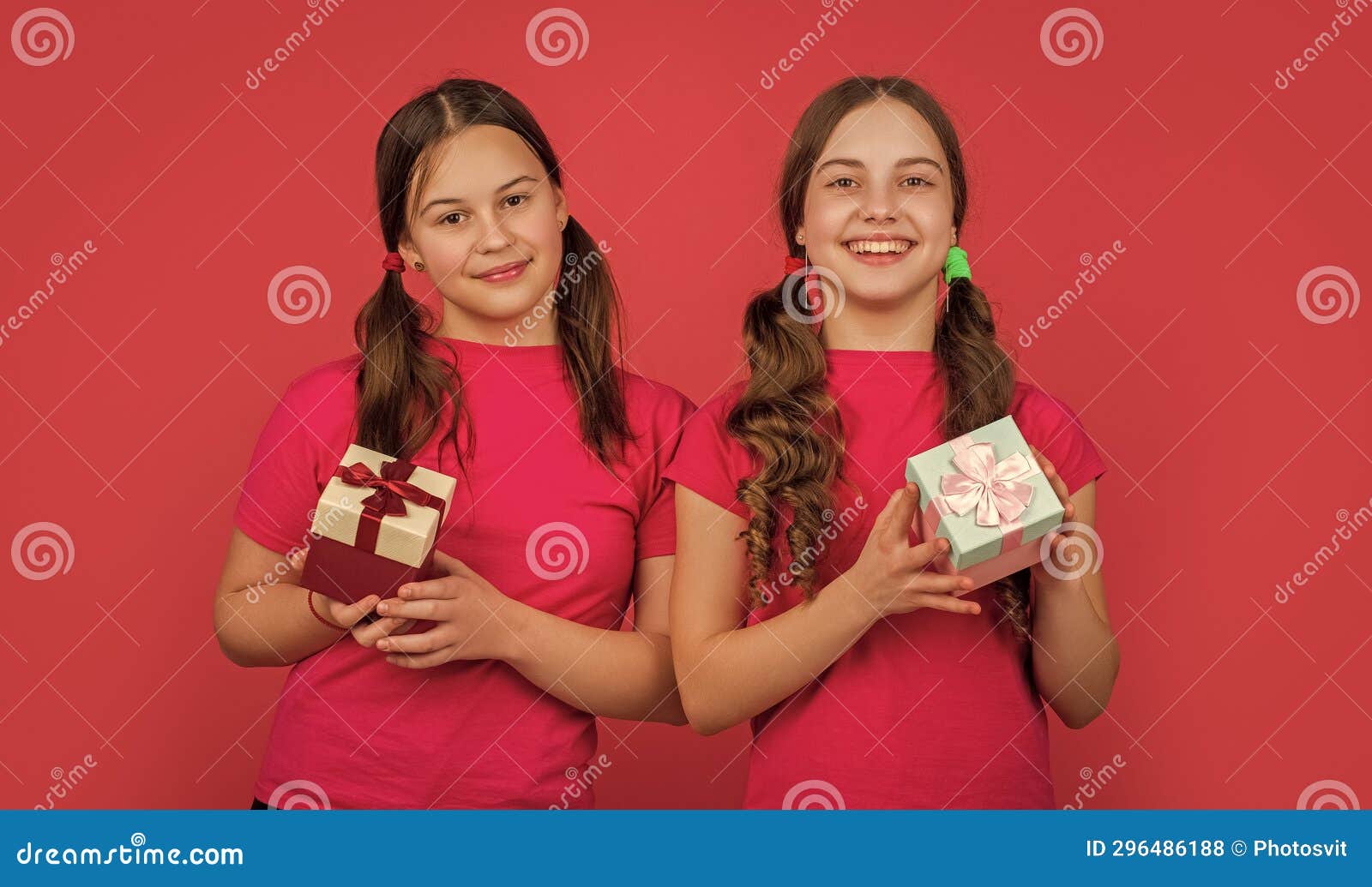 Glad Children with Present Boxes on Red Background Stock Photo - Image ...