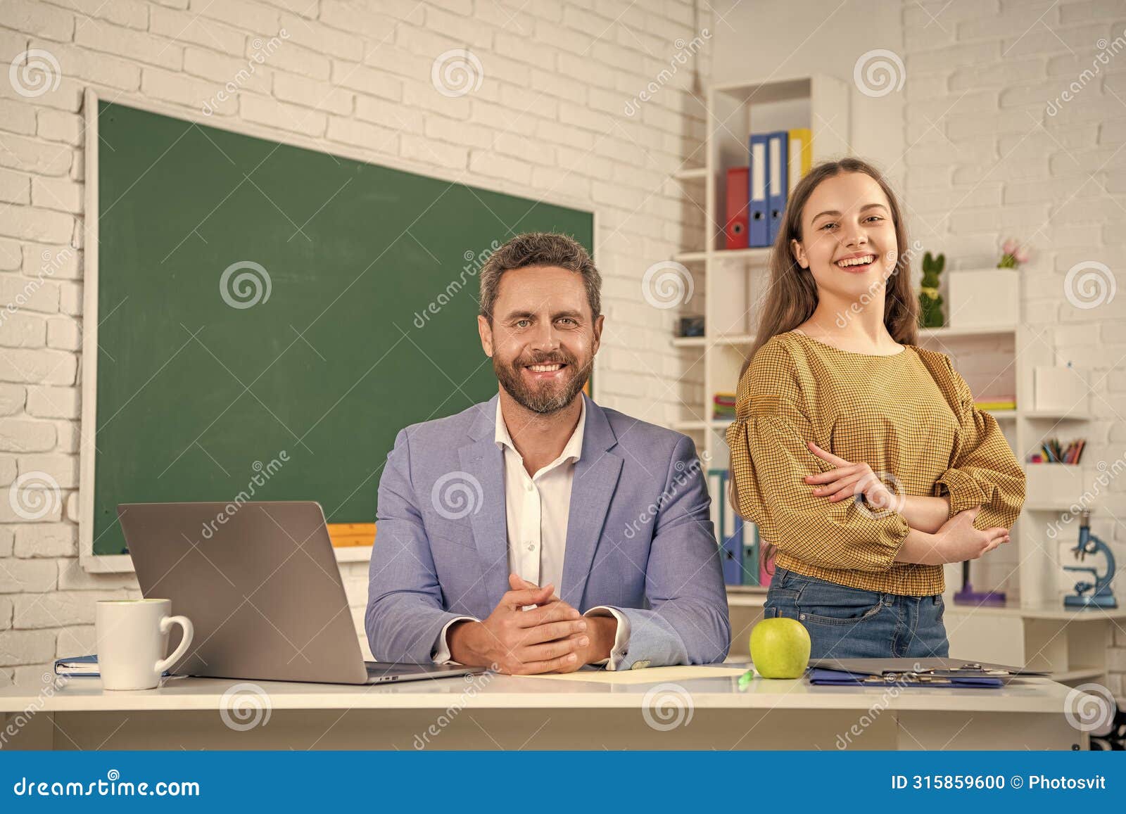 Glad Girl with Man Teacher in Classroom. Education Stock Photo - Image ...