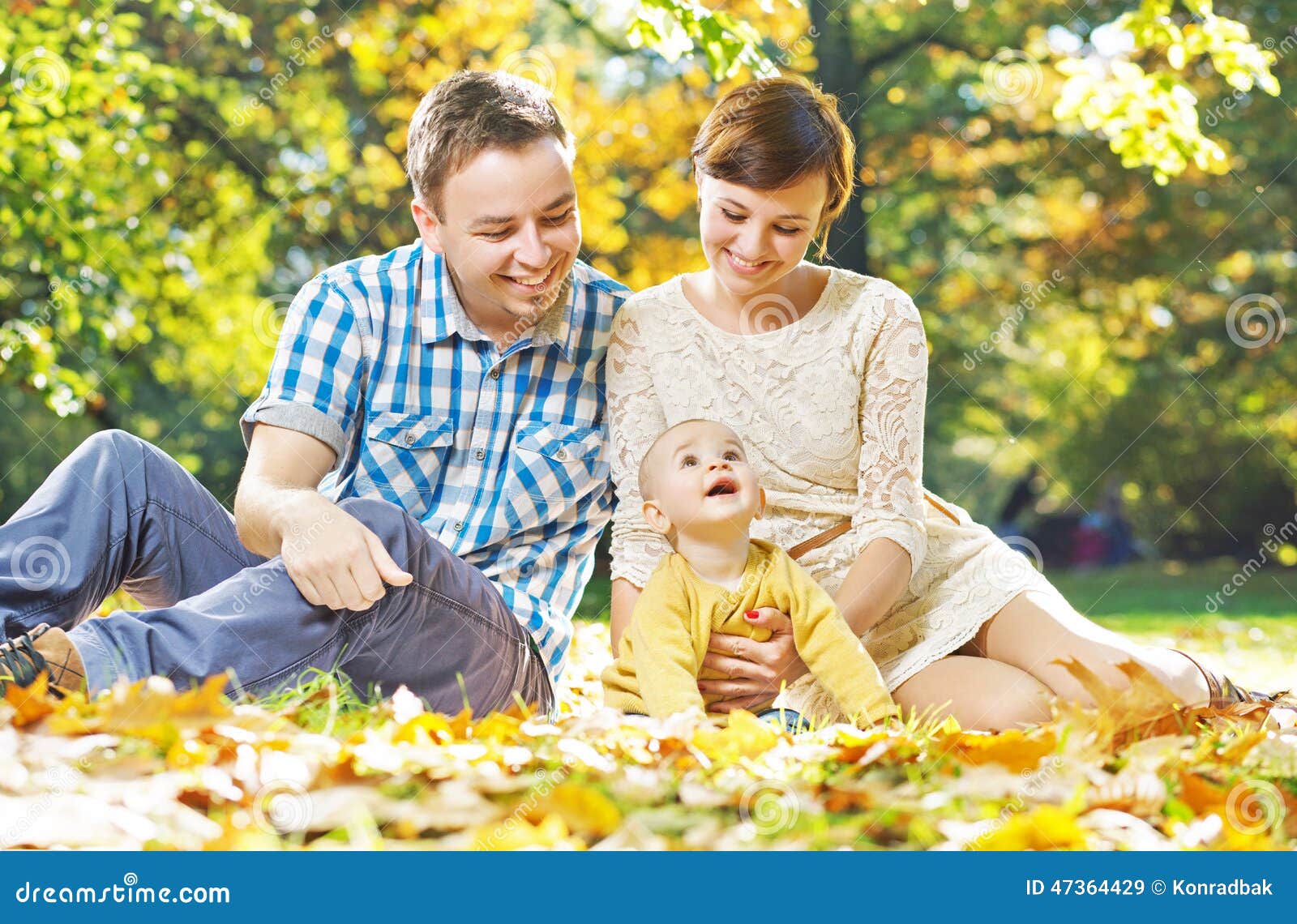 Glad Parents Observing Their Baby Stock Image - Image of life, happy ...
