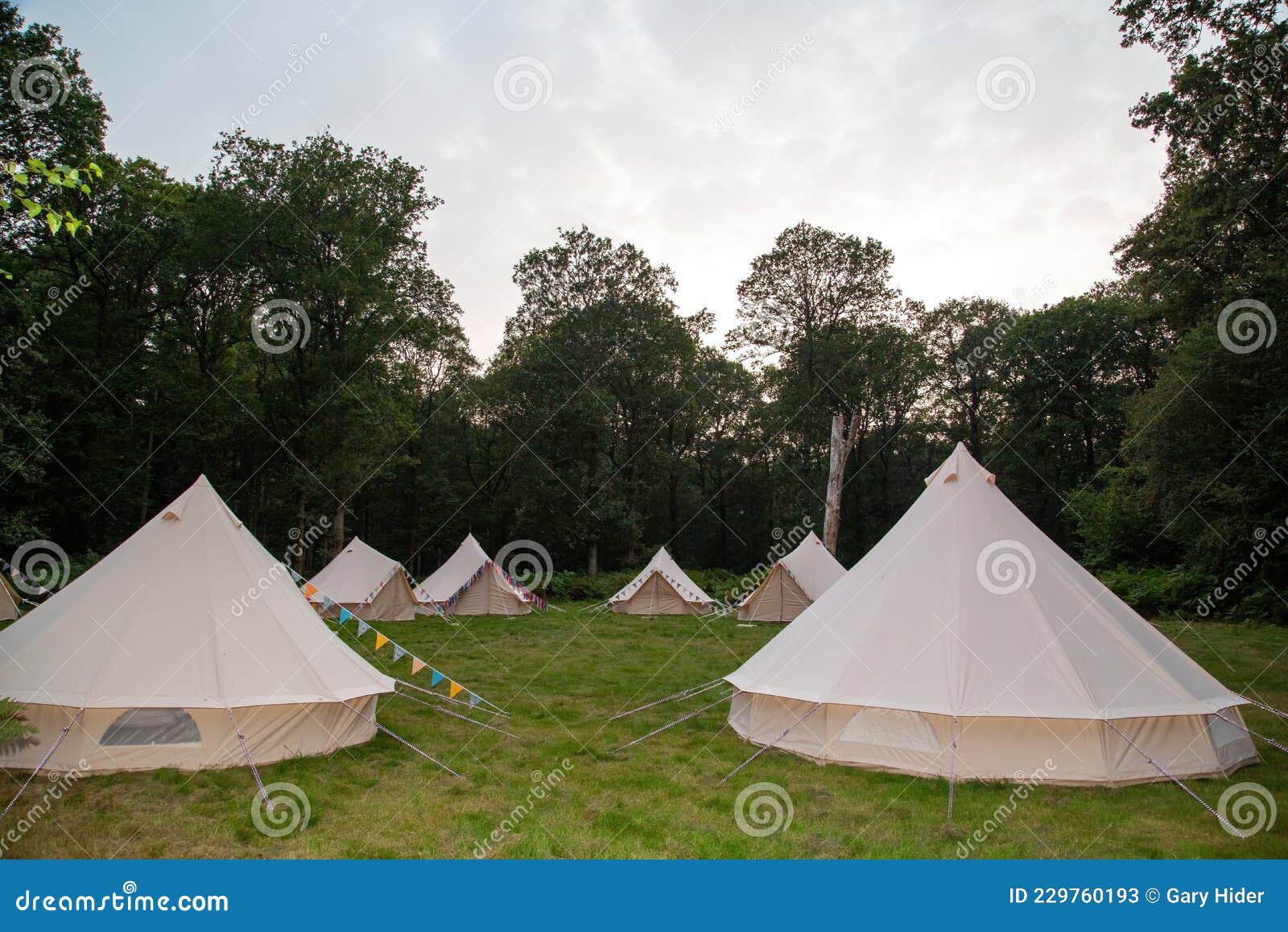 Glamping Teepees in a Circle in a Field Stock Image - Image of luxury ...