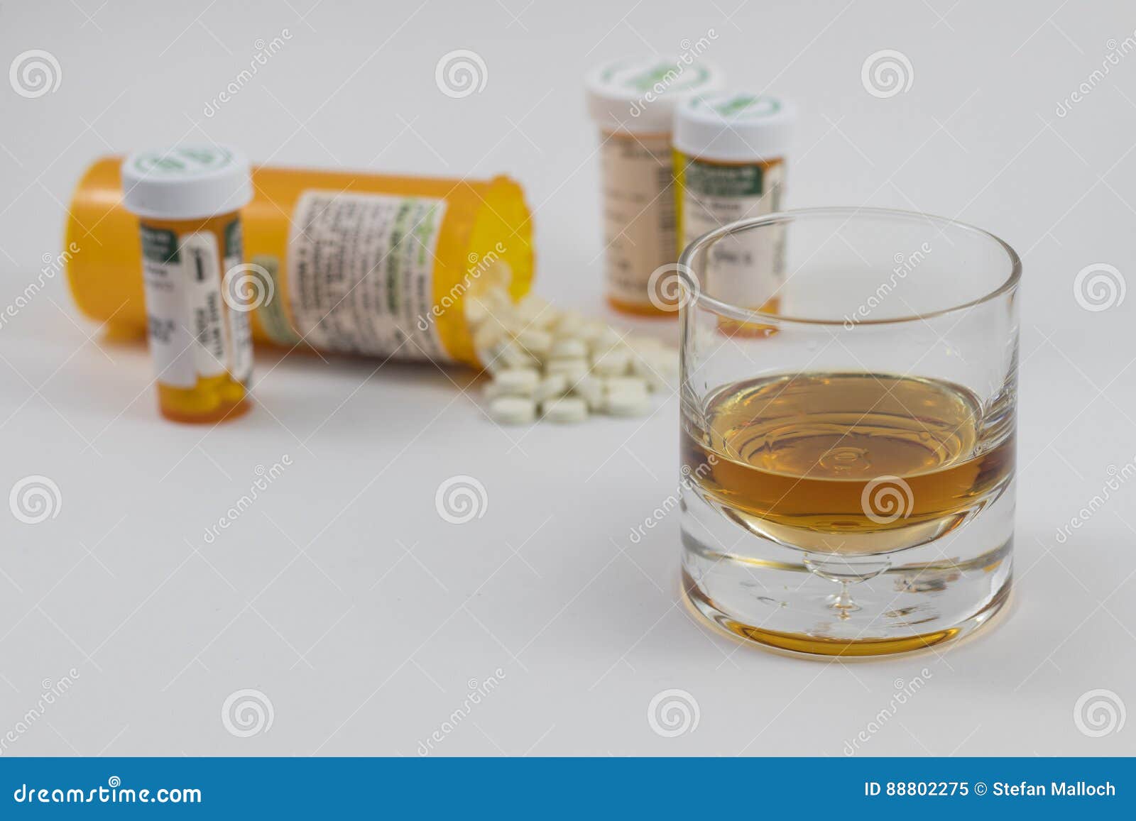 A Glass of Alcohol and Bottles of Pharmaceuticals Stock Image - Image ...