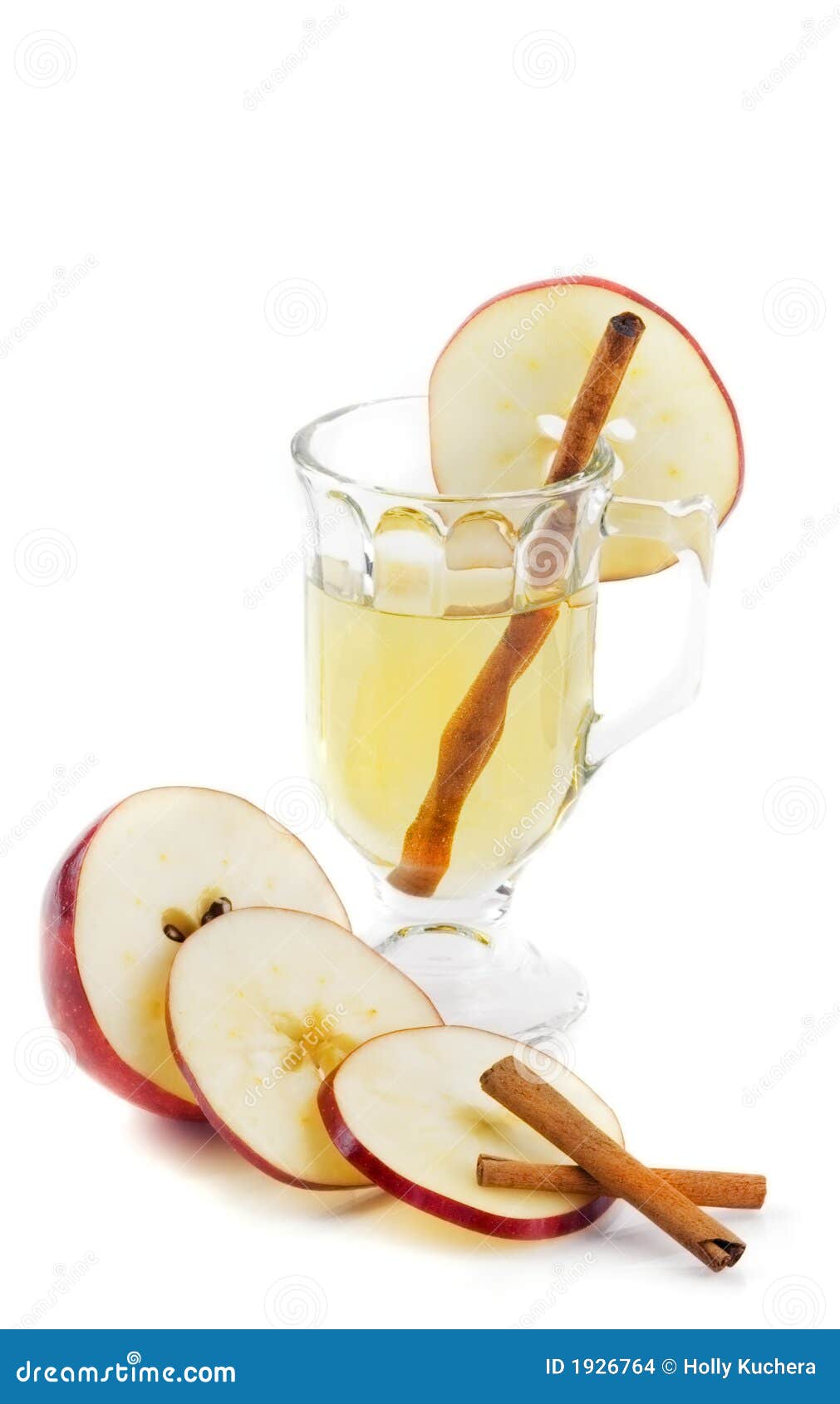 Glass of Apple Cider with Apple Slices and Cinnamon Sticks Stock Photo ...