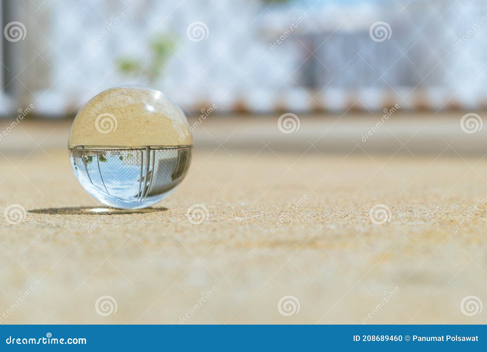 A Glass Ball is Placed on the Ground in the Sunlight Stock Photo ...