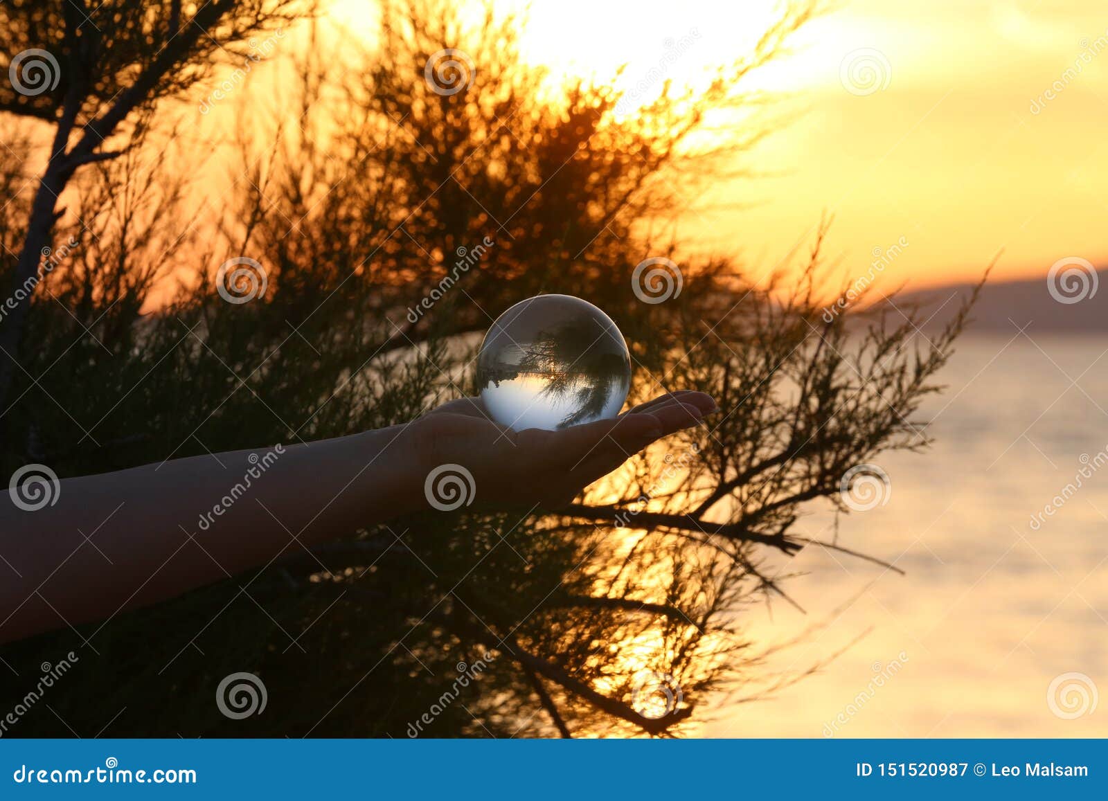 Sunset. Glass Ball Reflection of Sea Sunset Stock Image - Image of hand ...