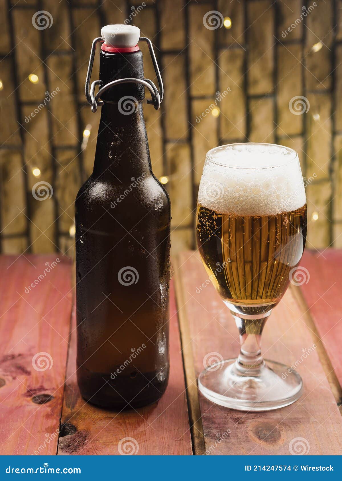 Glass of Beer with a Beer Bottle on the Side Stock Photo - Image of ...