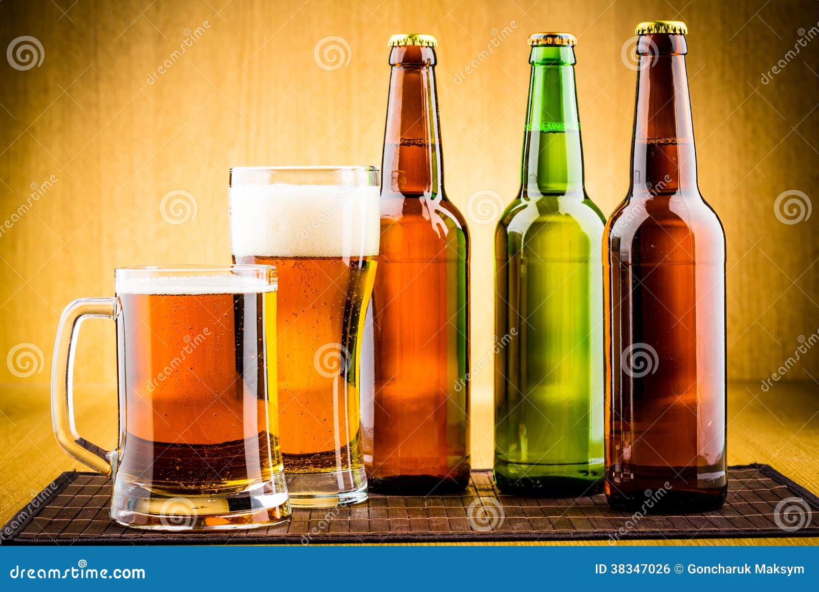 Glass of beer with bottles stock photo. Image of alcohol - 38347026