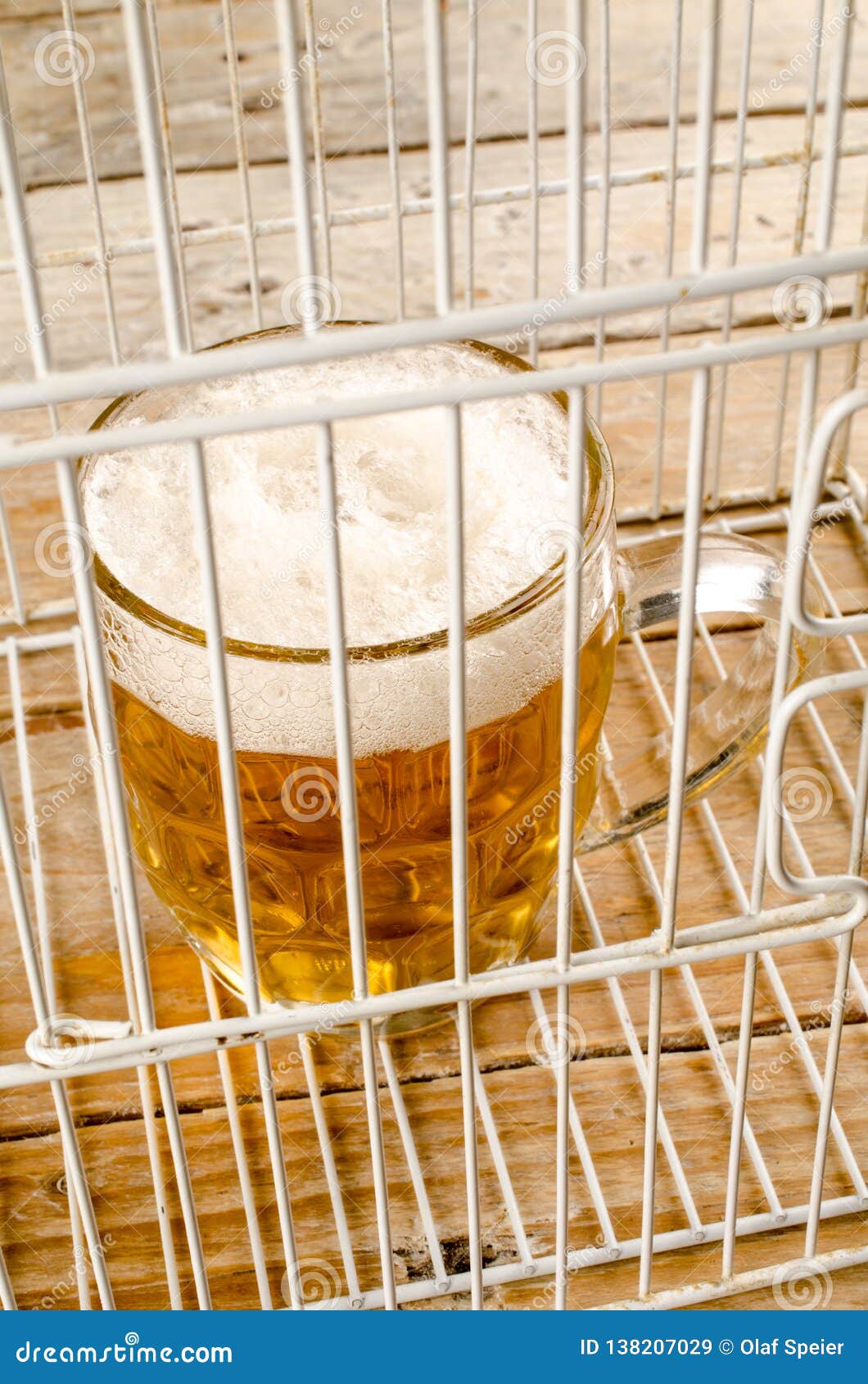 Glass of beer in a cage stock image. Image of caged - 138207029