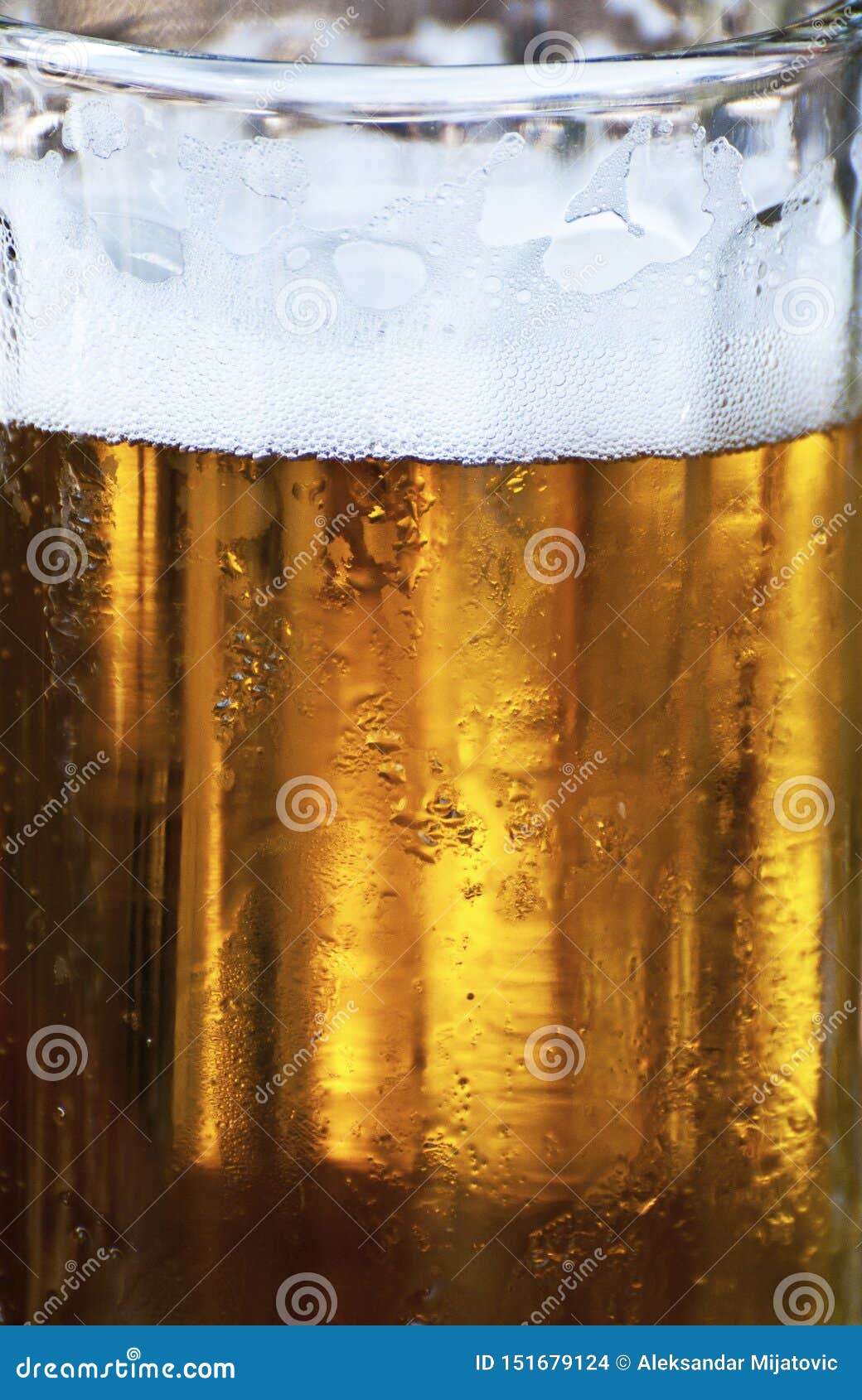 Glass of beer close-up stock photo. Image of backlit - 151679124