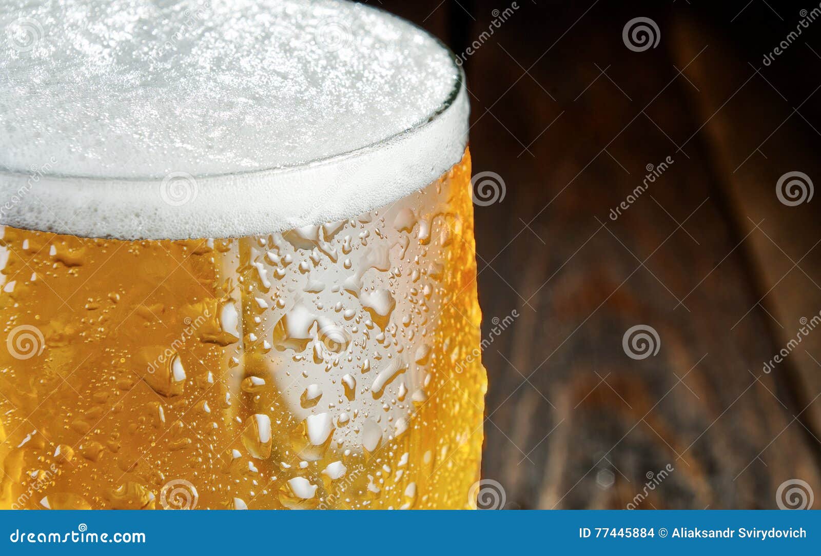 Glass of Beer with Drops. Close-up. Blurred Background. Stock Photo ...
