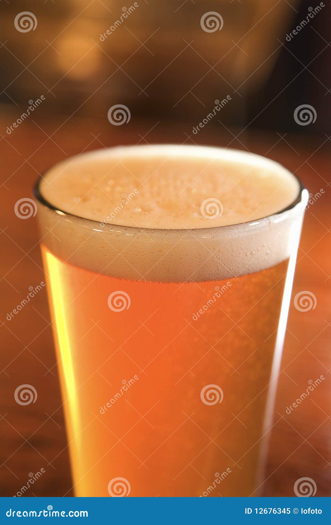 Glass of Beer with Foam stock image. Image of pilsner - 12676345
