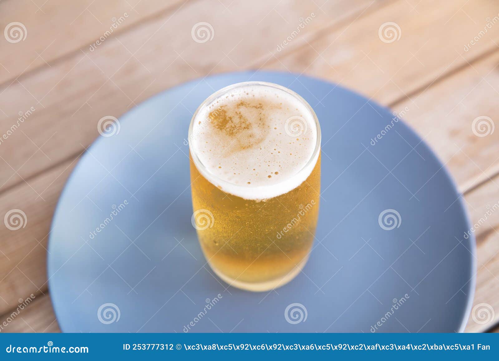 A Glass of Beer on the Plate Stock Photo - Image of life, walnut: 253777312