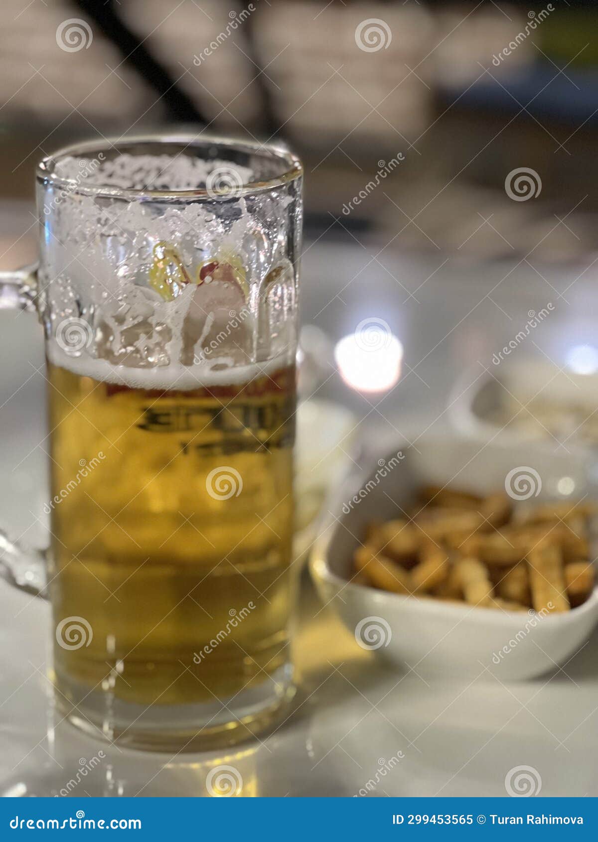 Glass of Beer and Snacks on the Table in a Pub or Restaurant Stock ...