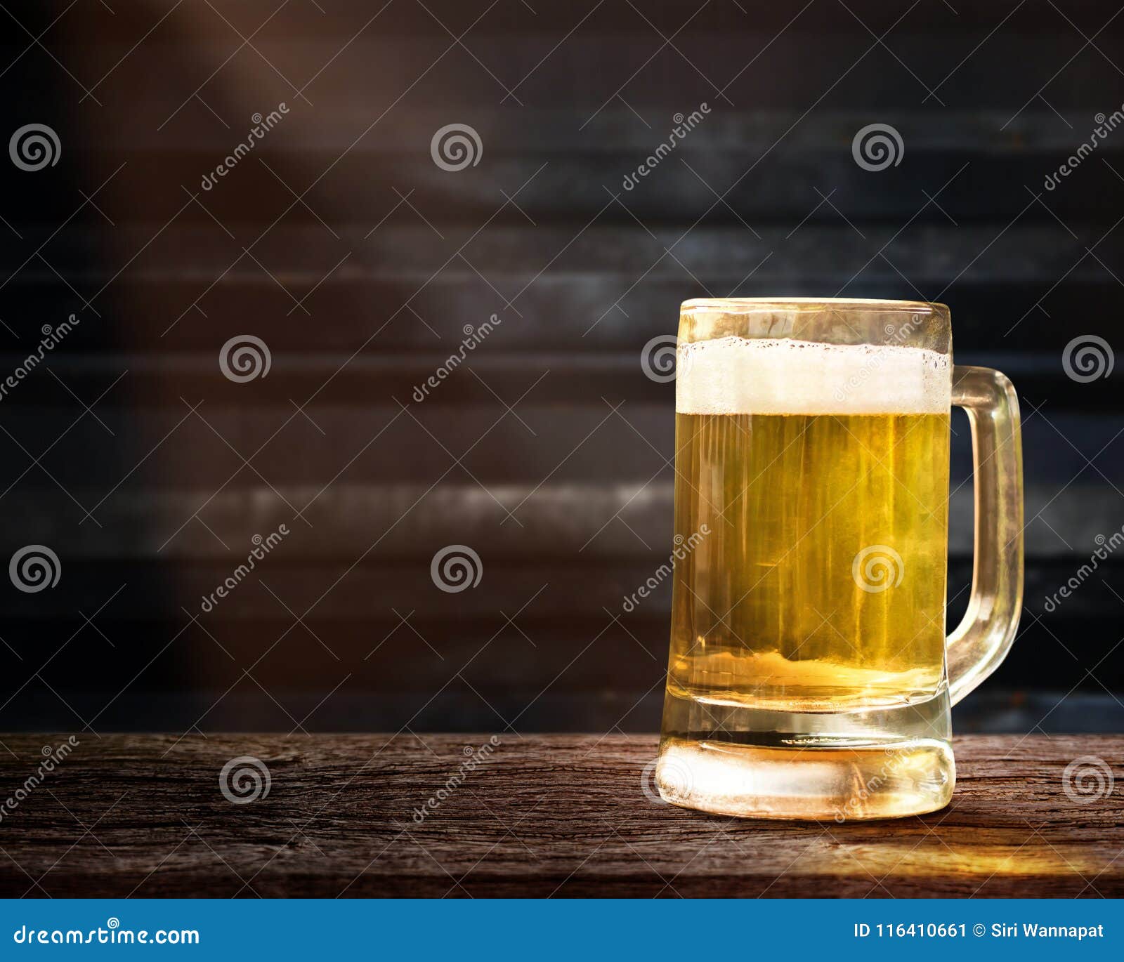 Glass of Beer on Wooden Table in Pub or Restaurant Stock Image - Image ...