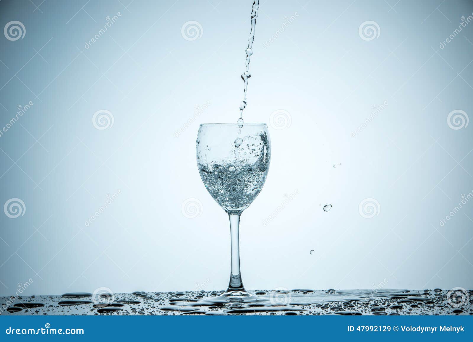 Glass Being Filled with Water Stock Image - Image of background ...