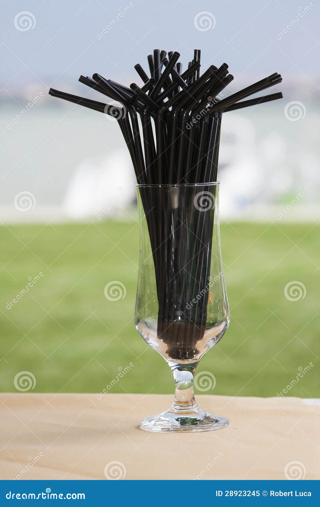 Glass of black straws stock image. Image of background - 28923245