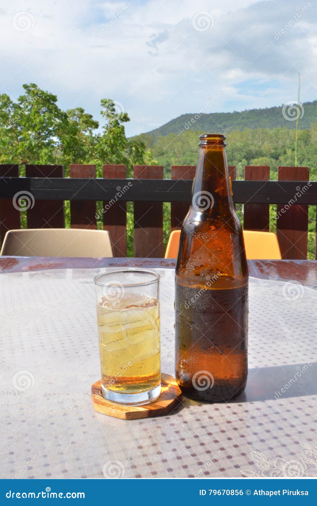 Glass and Bottle of Beer on the Table Stock Photo - Image of bottle ...