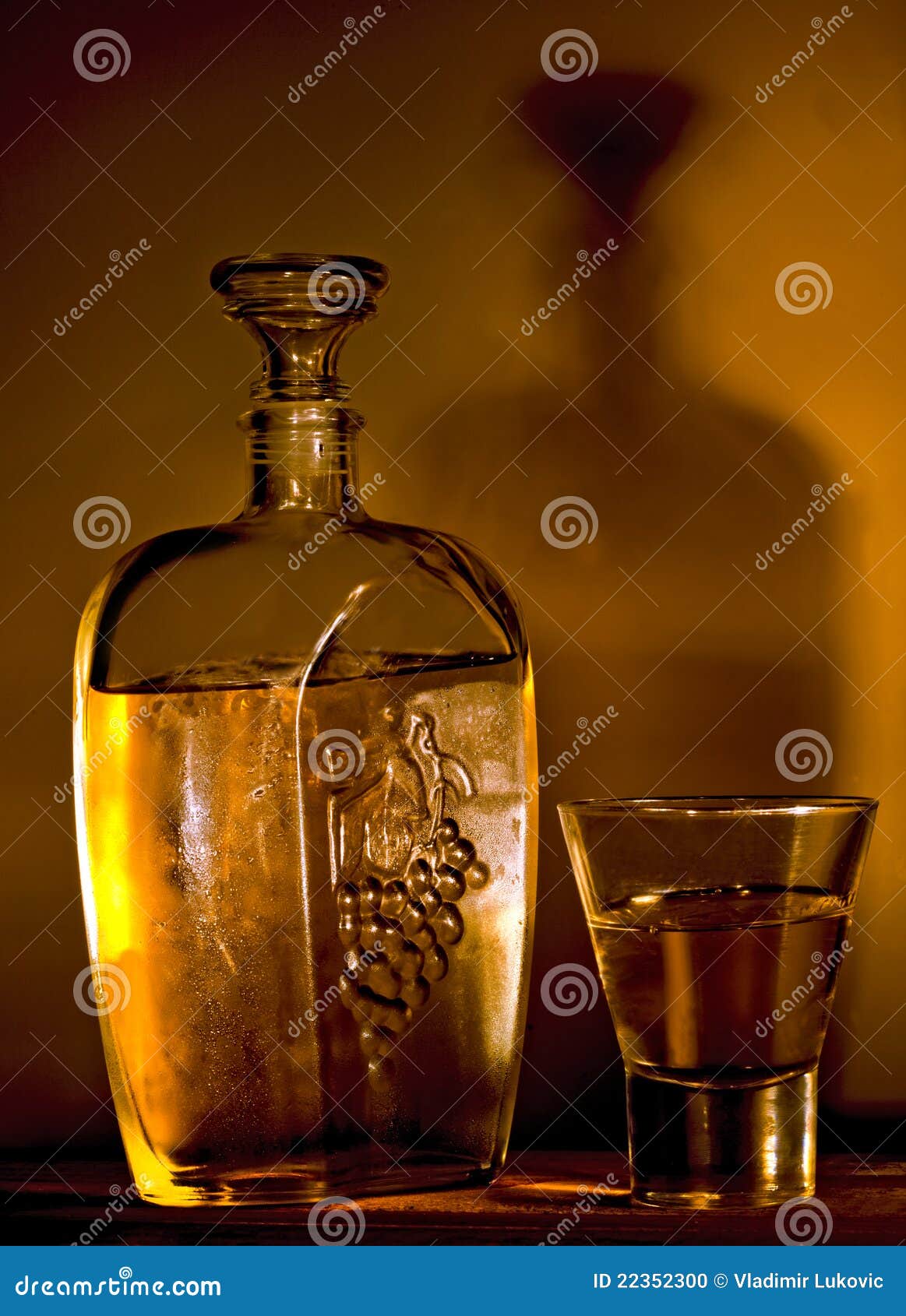 Glass and bottle of brandy stock photo. Image of nobility - 22352300