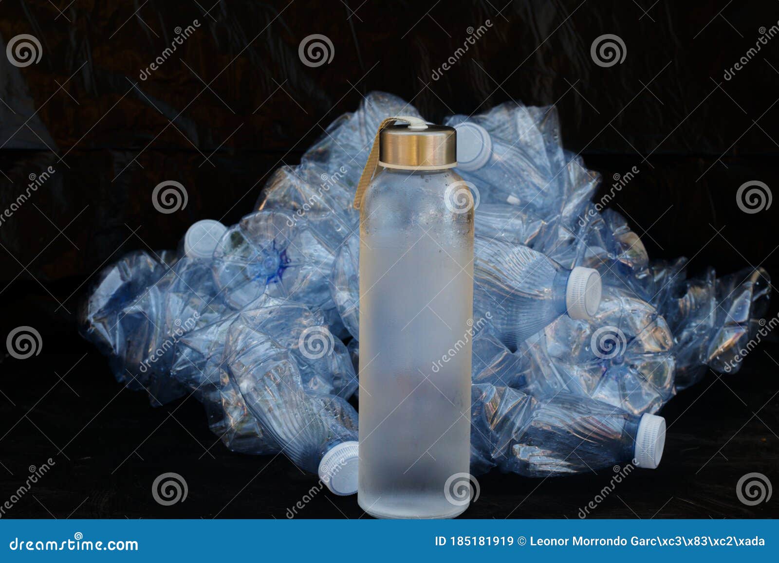Glass Bottle in Front of Stack of Plastic Bottles, No More Plastics ...