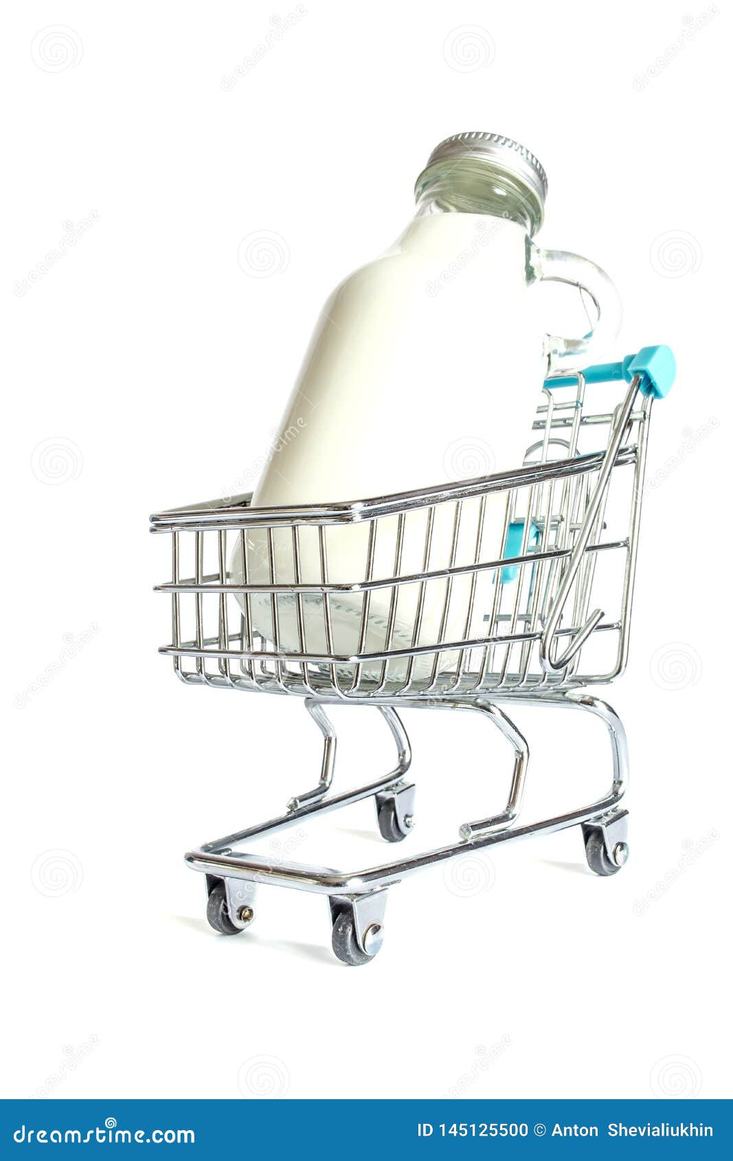 Glass Bottle with Milk in a Shopping Cart Close-up, Isolated on White ... Glass Bottle with Milk in a Shopping Cart Close-up, Isolated on White ...
