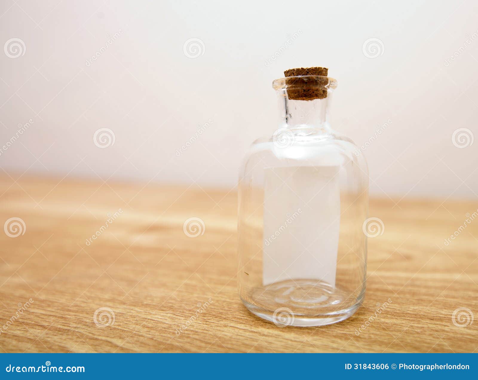 Glass Bottle with Note Inside Stock Photo - Image of furniture, paper ...