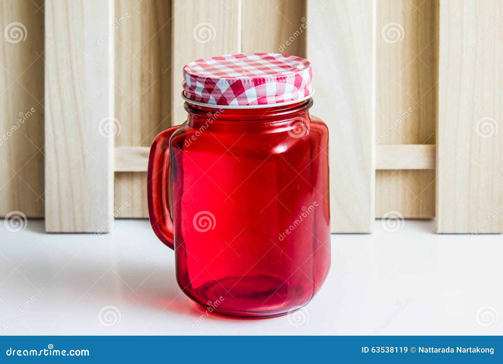 Glass bottle with red cap stock image. Image of glossy - 63538119