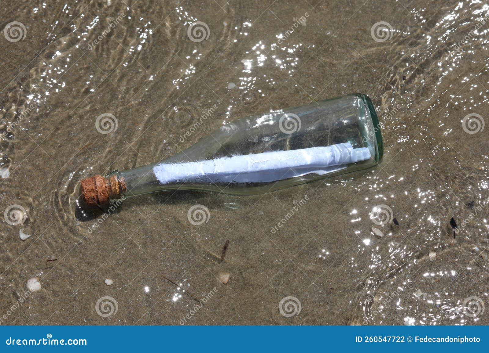 Glass Bottle with a Secret Message by the Sea Stock Photo - Image of ...