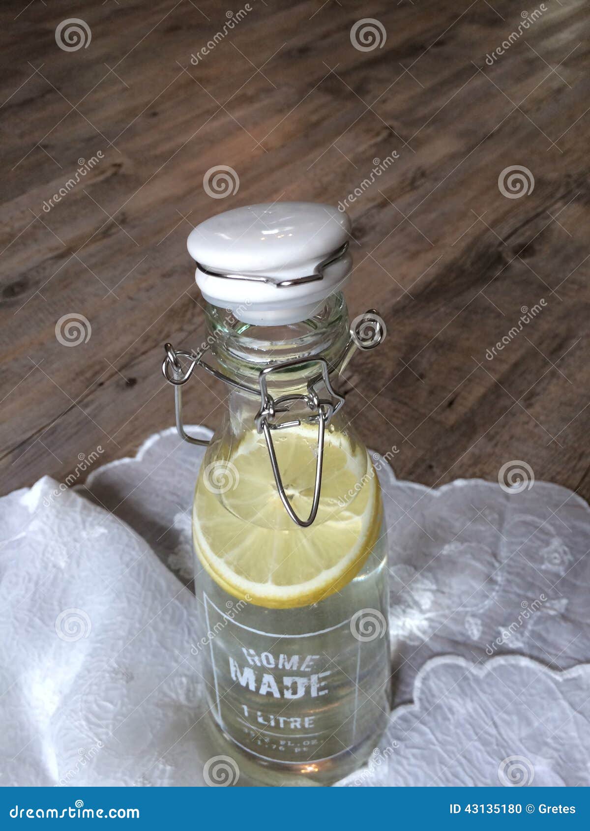 Glass Bottle of Water with Lemon Stock Photo - Image of glass, bottle ...