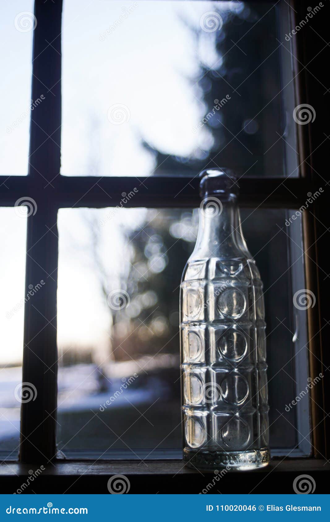 Glass Bottle in Window stock photo. Image of empty, abstract - 110020046