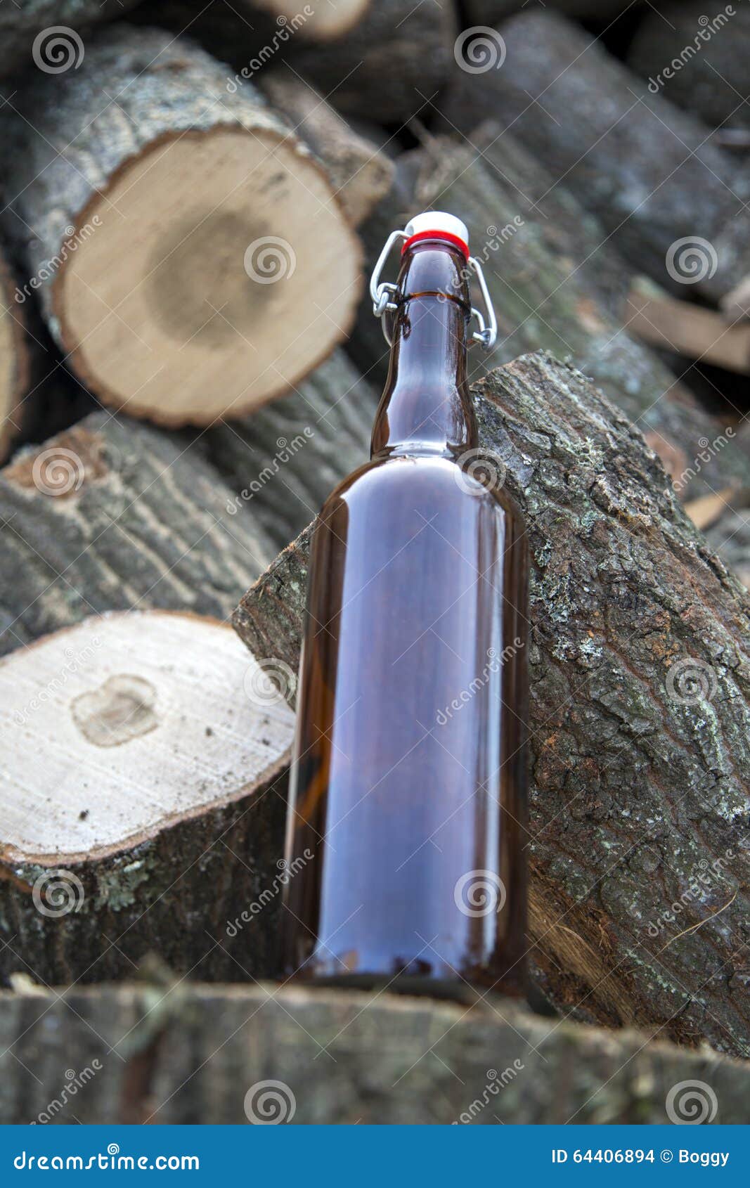 Glass Bottle on Wooden Stack Stock Photo - Image of close, environment ...