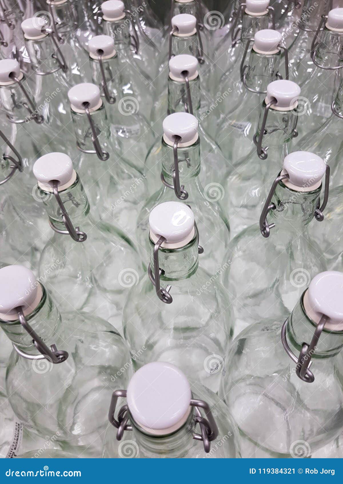Glass Bottles on a Table in a Shop Display Stock Image - Image of green ...