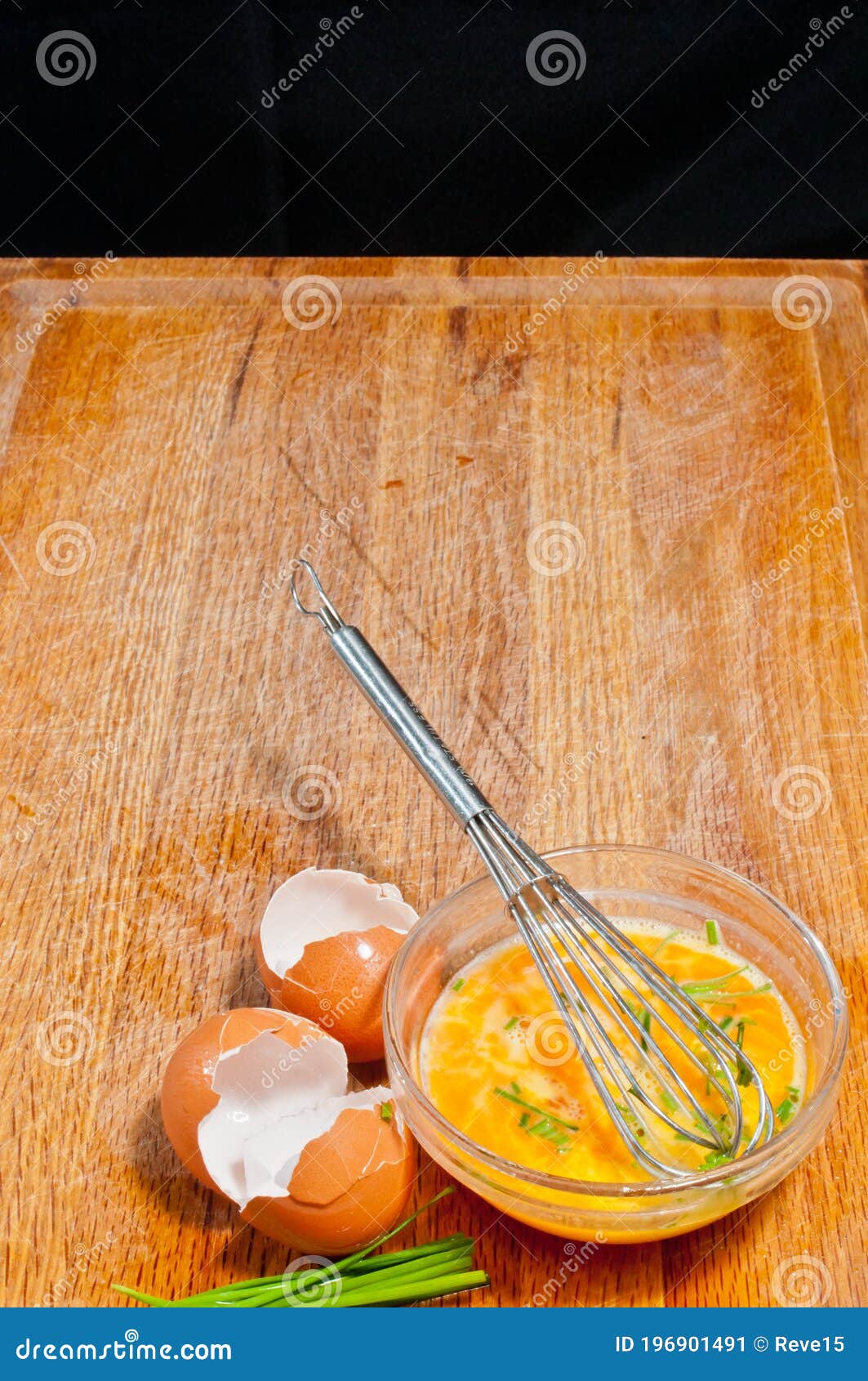Glass Bowel of Egg with Chef`s Hand and Whisk, Egg Shell and Three ...