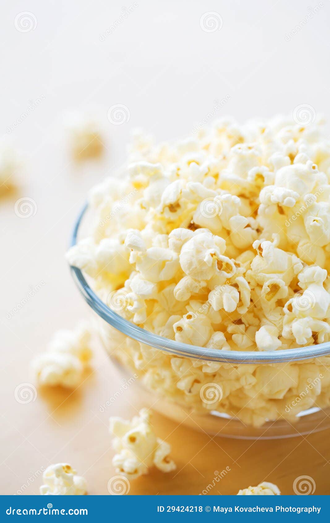 Glass bowl full of popcorn stock photo. Image of bowl - 29424218