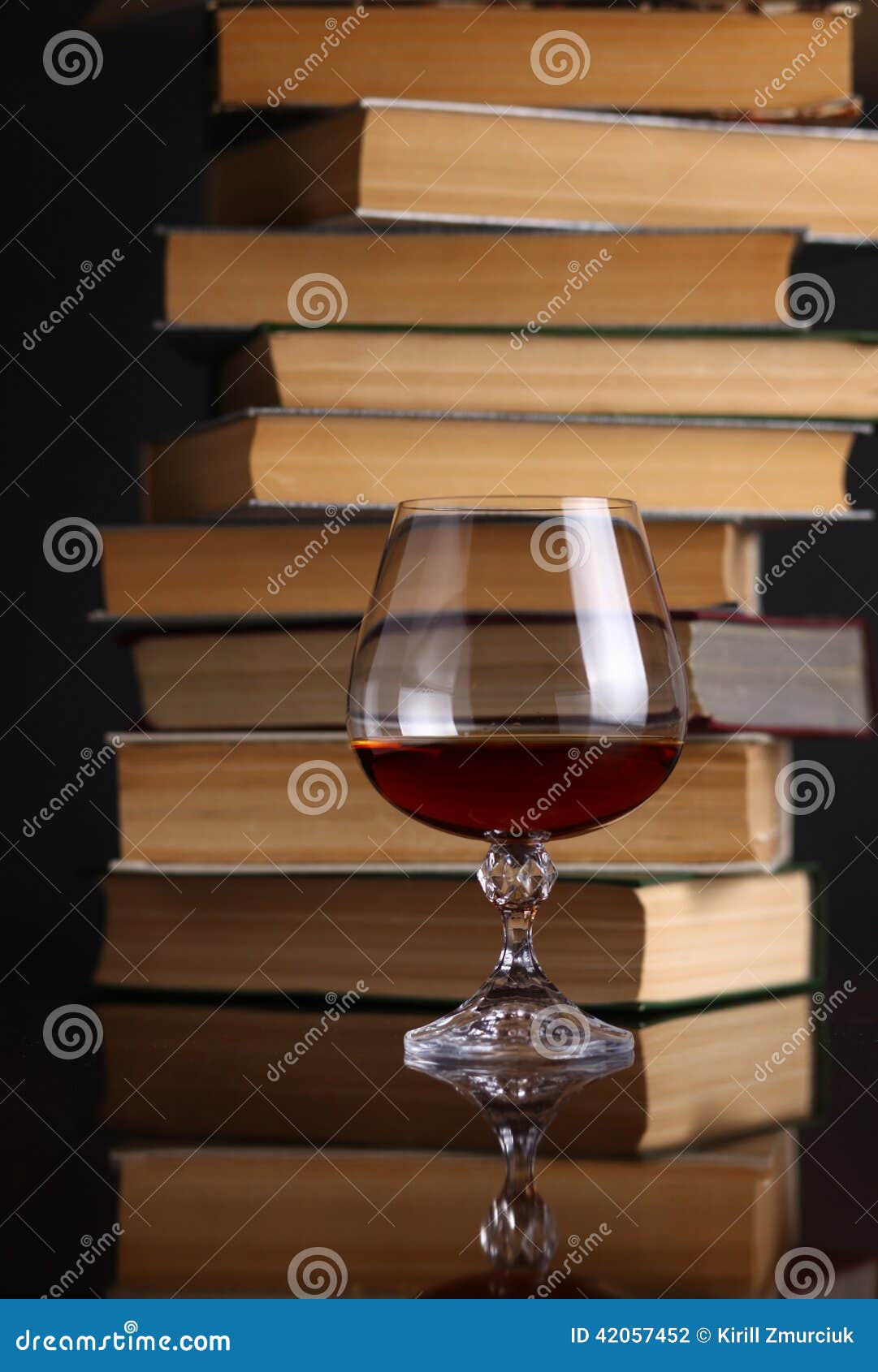 Glass of brandy and books stock photo. Image of alcohol - 42057452