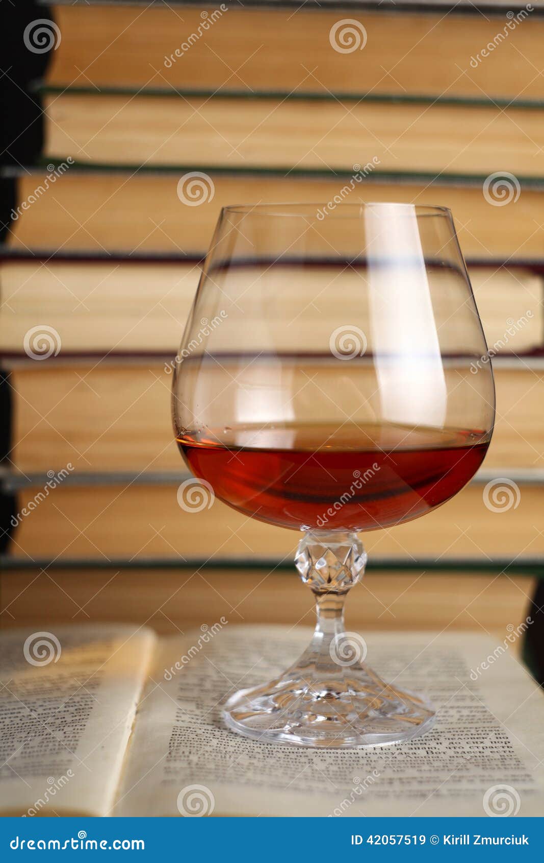 Glass of brandy on books stock image. Image of book, style - 42057519