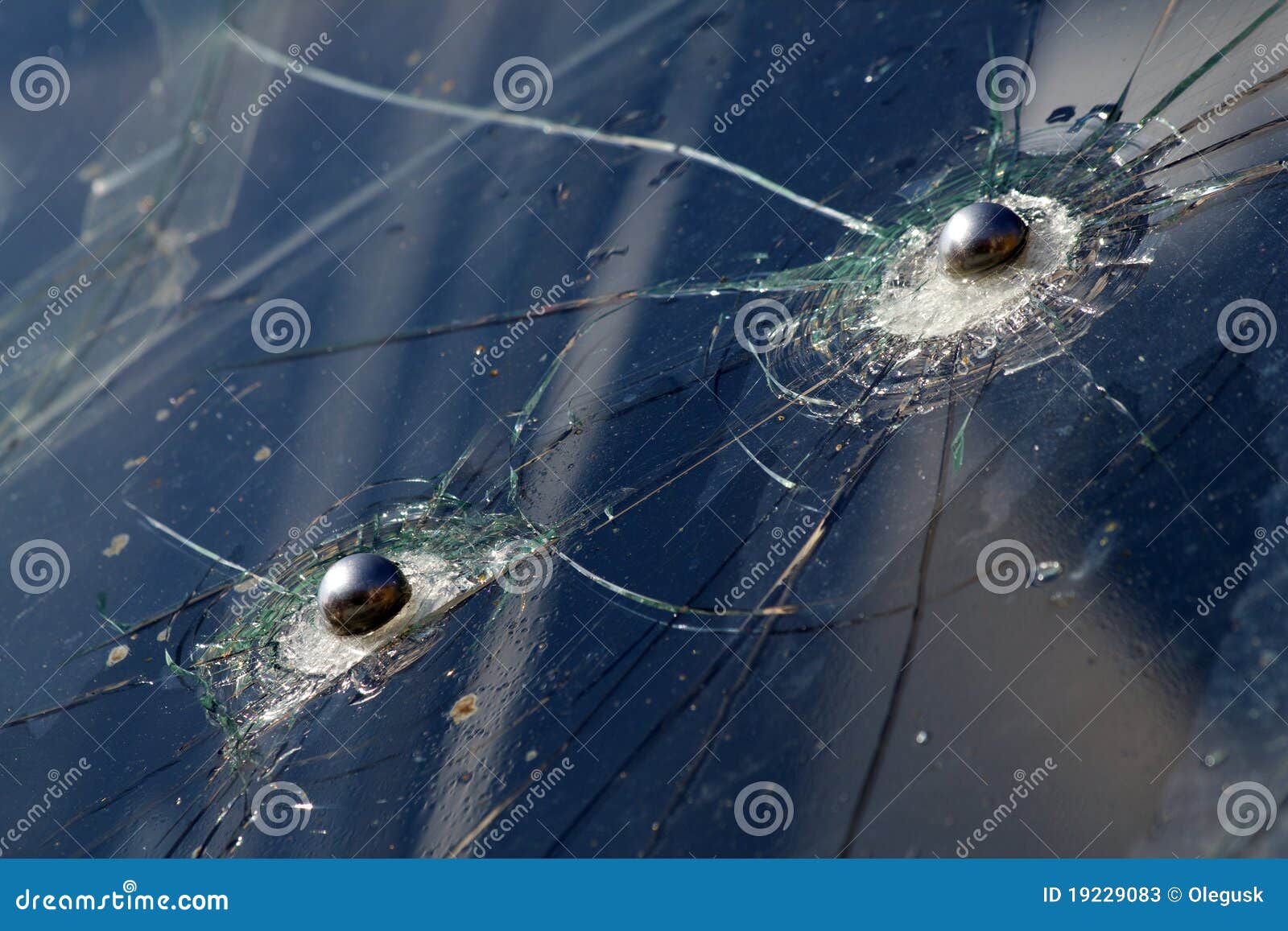 Glass broken bullets shots stock image. Image of steel - 19229083