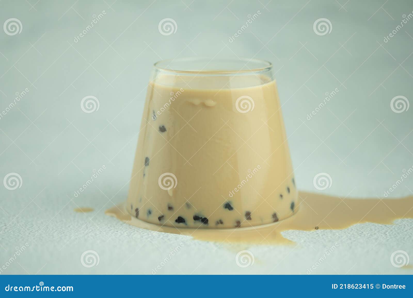 Glass of Bubble Milk Tea and Spilled Milk Tea on Floor Stock Image ...