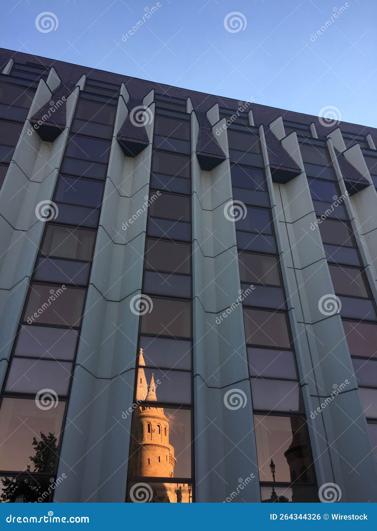 Glass Building with Tower Reflected in Its Windows Stock Photo - Image ...