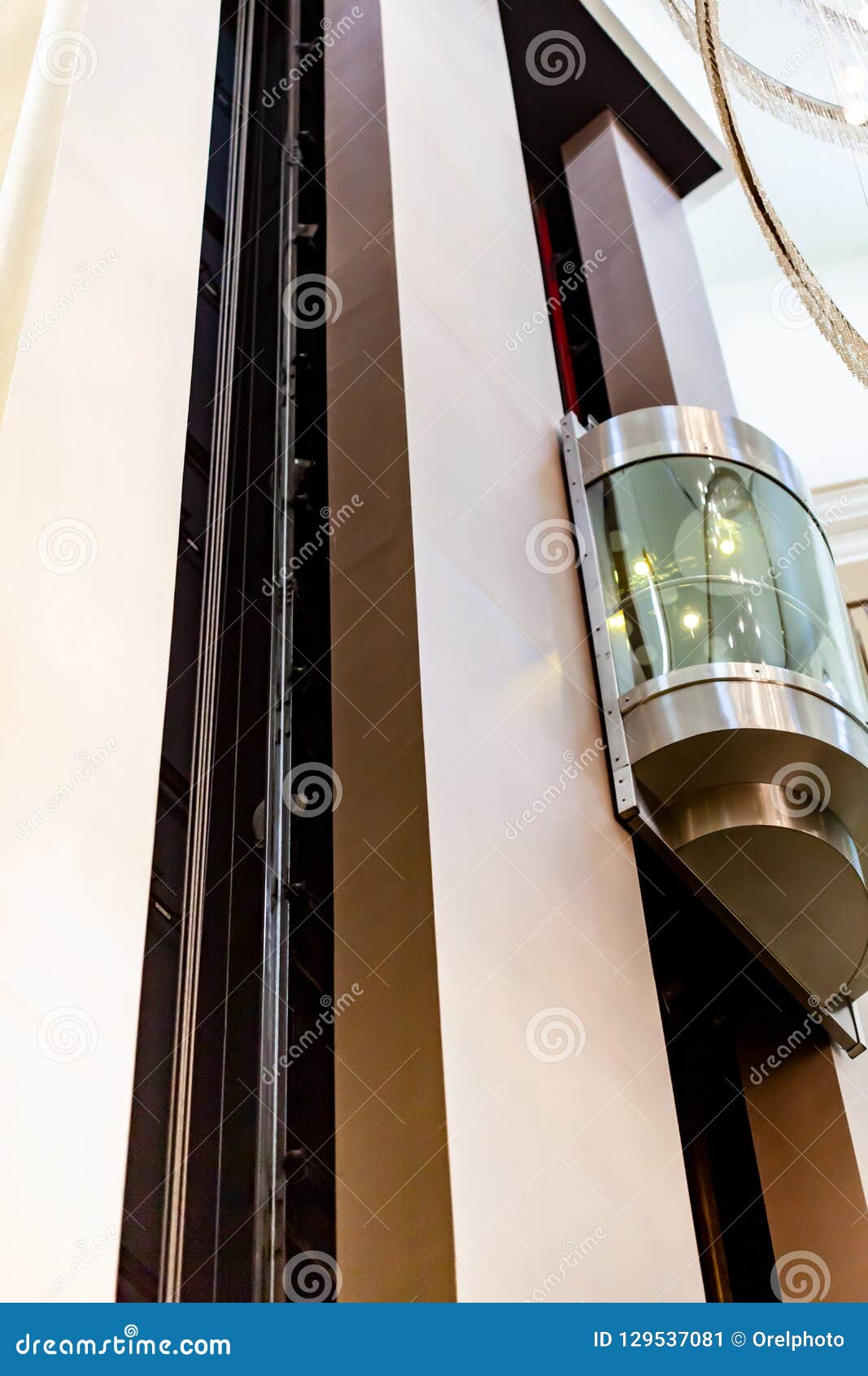 Glass Capsule Elevator in the Hall at Luxury Hotel Stock Image - Image ...